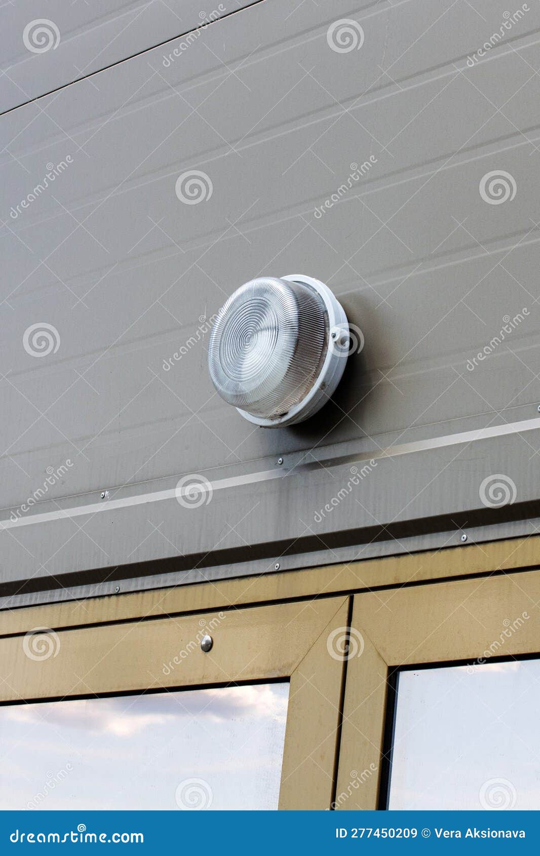 Lamp Above Front Door on Facade of Building Stock Image - Image of lamp ...
