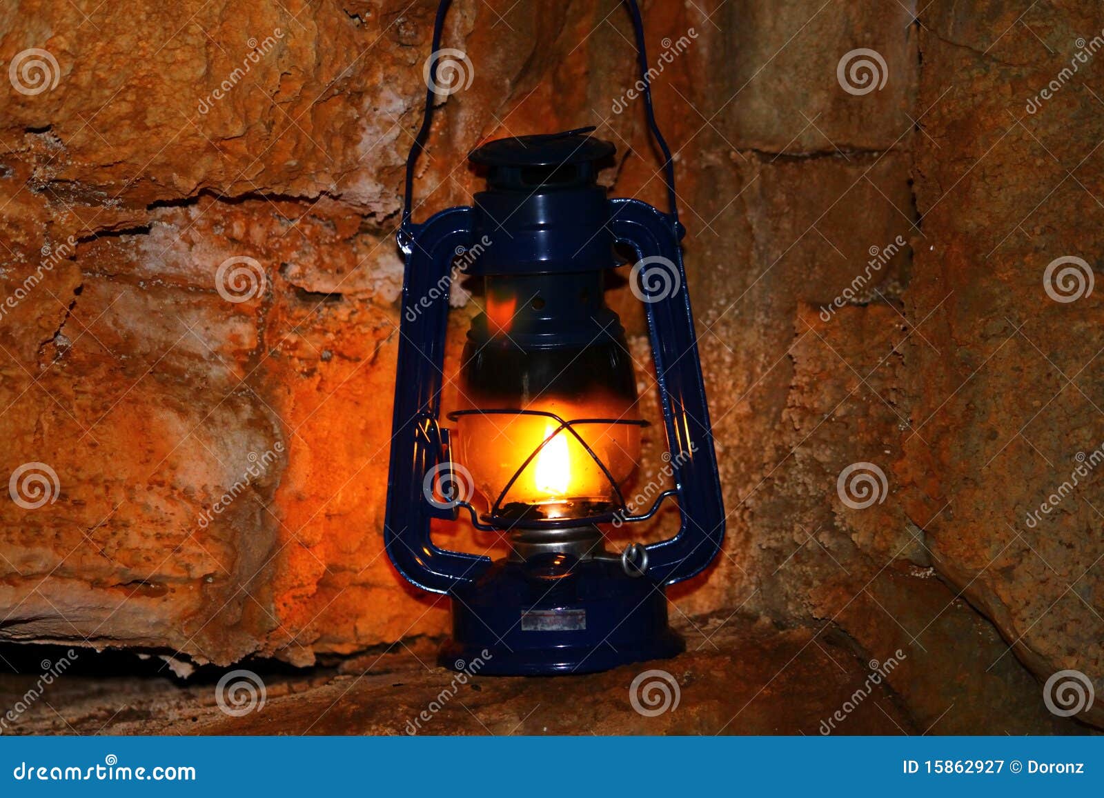Lamp on a cave wall stock image. Image of mountain, explore - 15862927