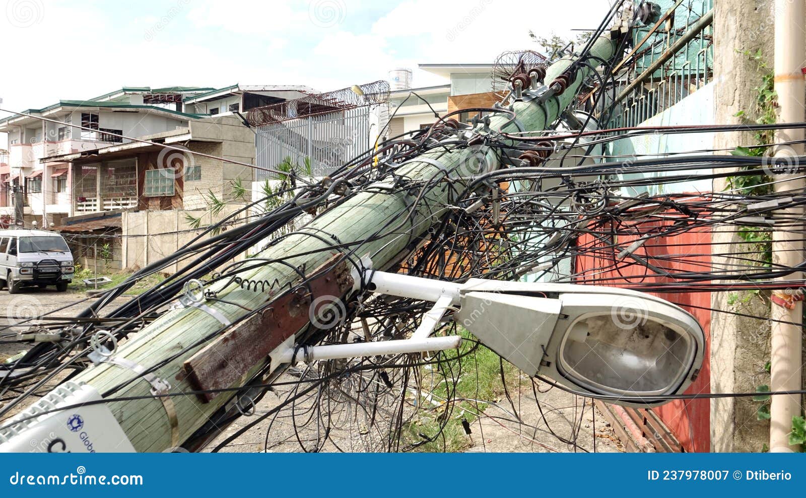 A Lamp and Fallen Utility Pole Editorial Photography - Image of ...