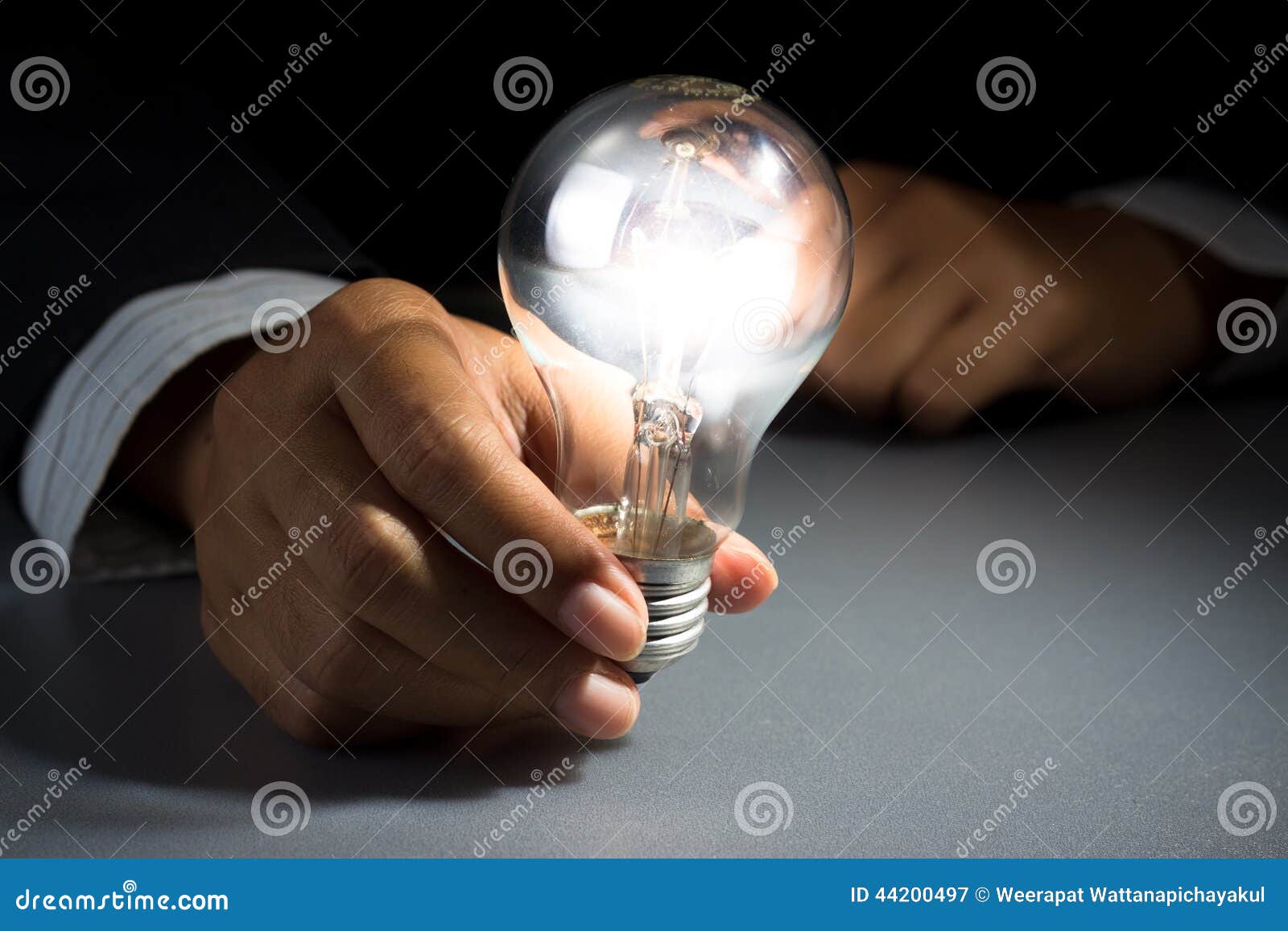 Lamp in hand stock image. Image of concept, bright, electricity - 44200497
