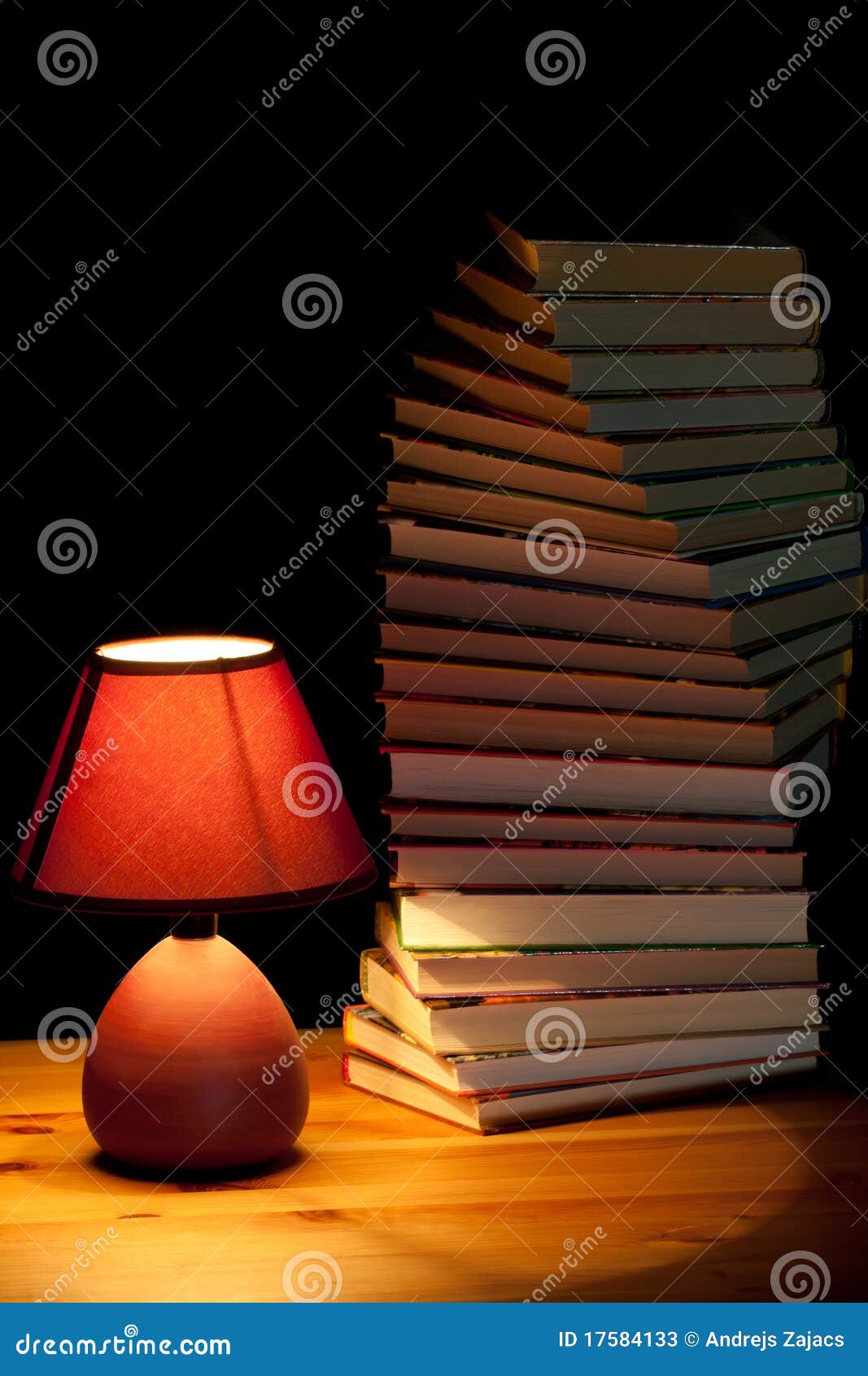 Lamp illuminating books stock image. Image of home, bedroom - 17584133
