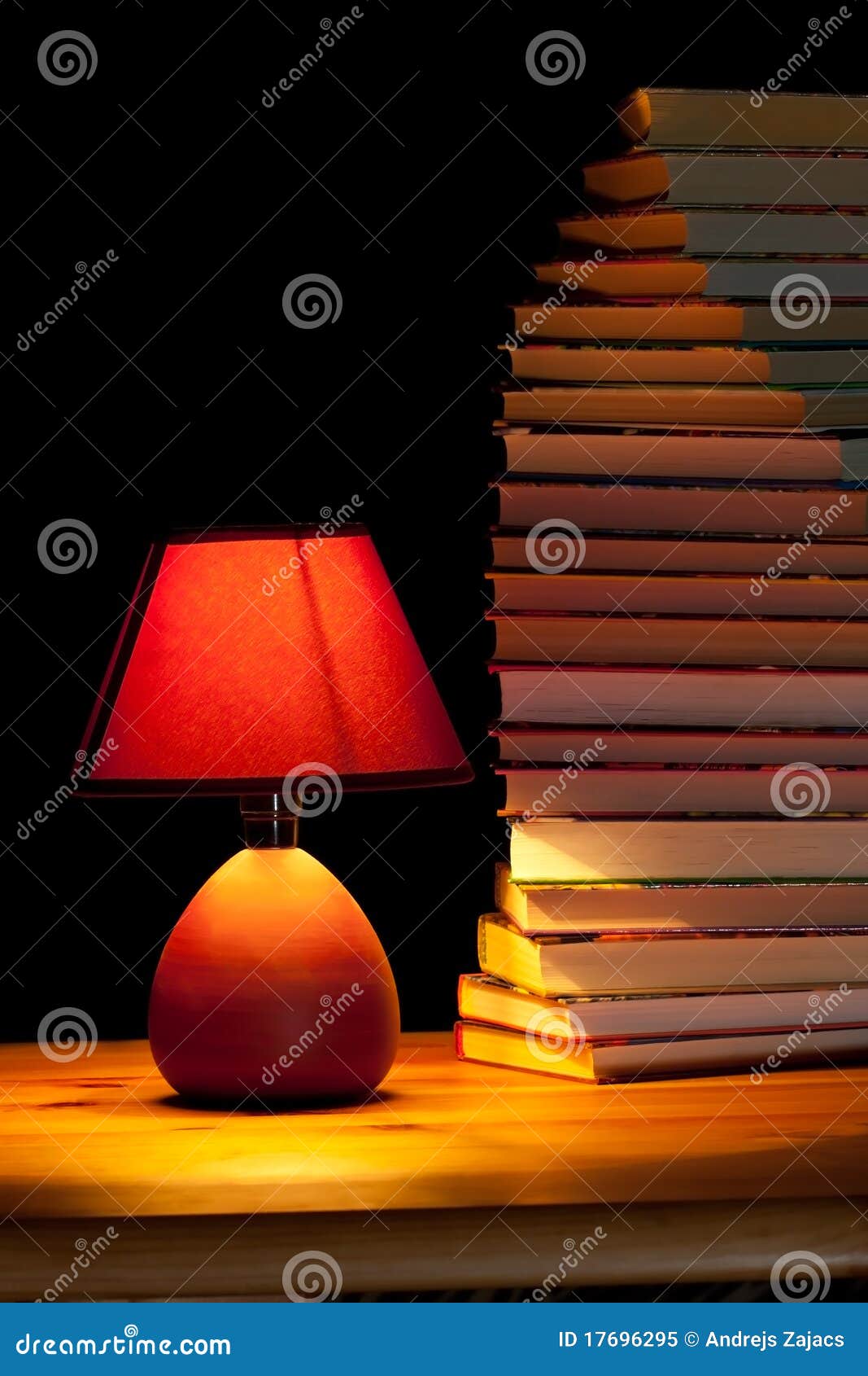 Lamp illuminating books stock image. Image of dark, bulb - 17696295