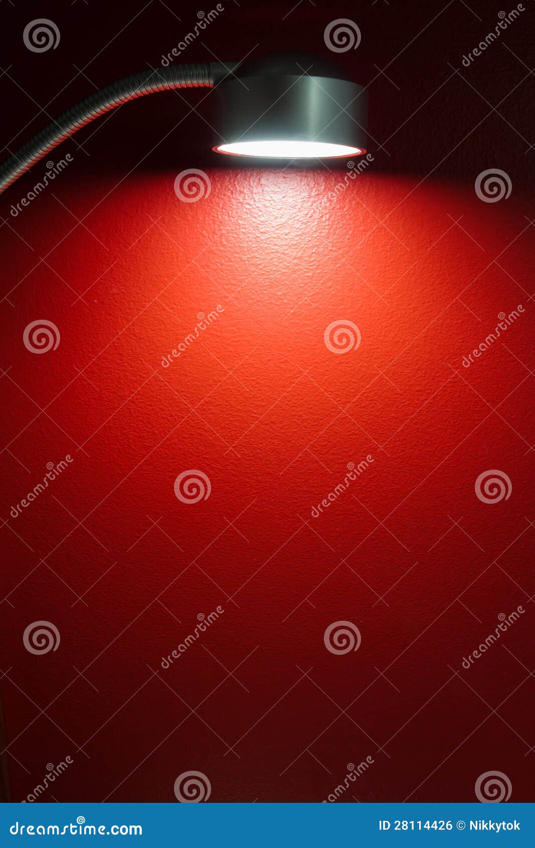 Lamp illuminating red wall stock photo. Image of electric - 28114426