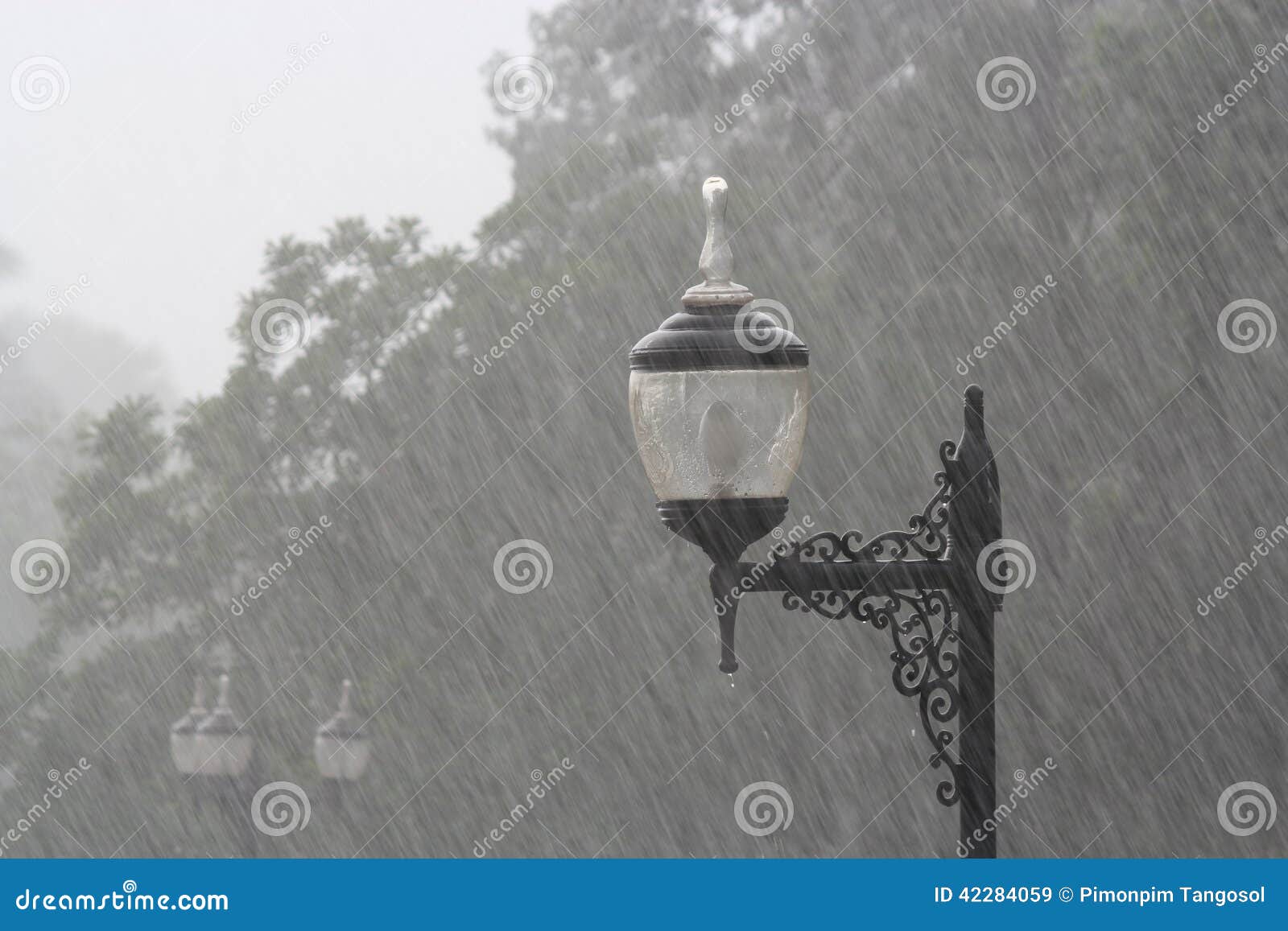 Lamp in a misty raining stock image. Image of metal, background - 42284059