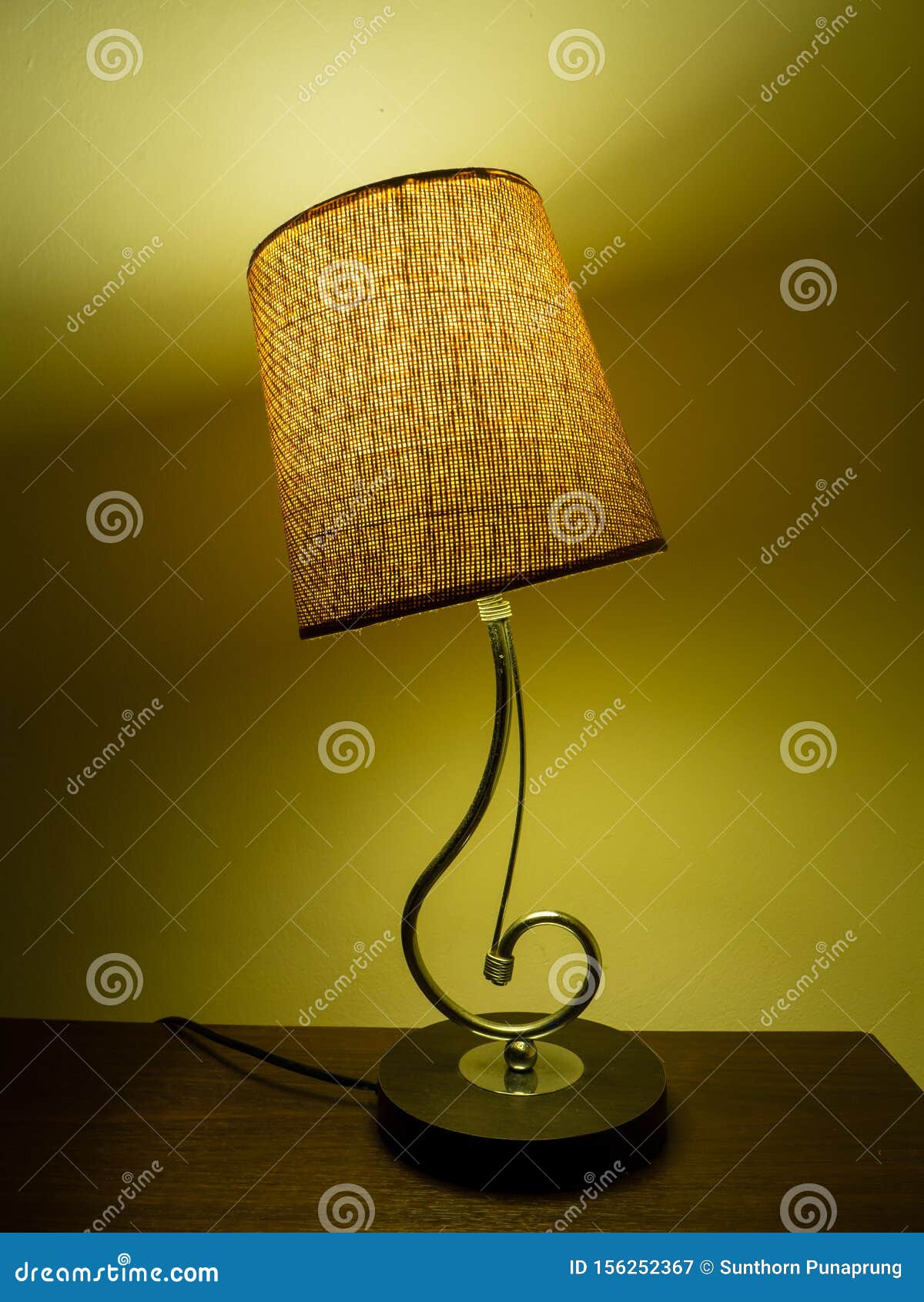 Lamp on a night table stock image. Image of bright, bulb - 156252367