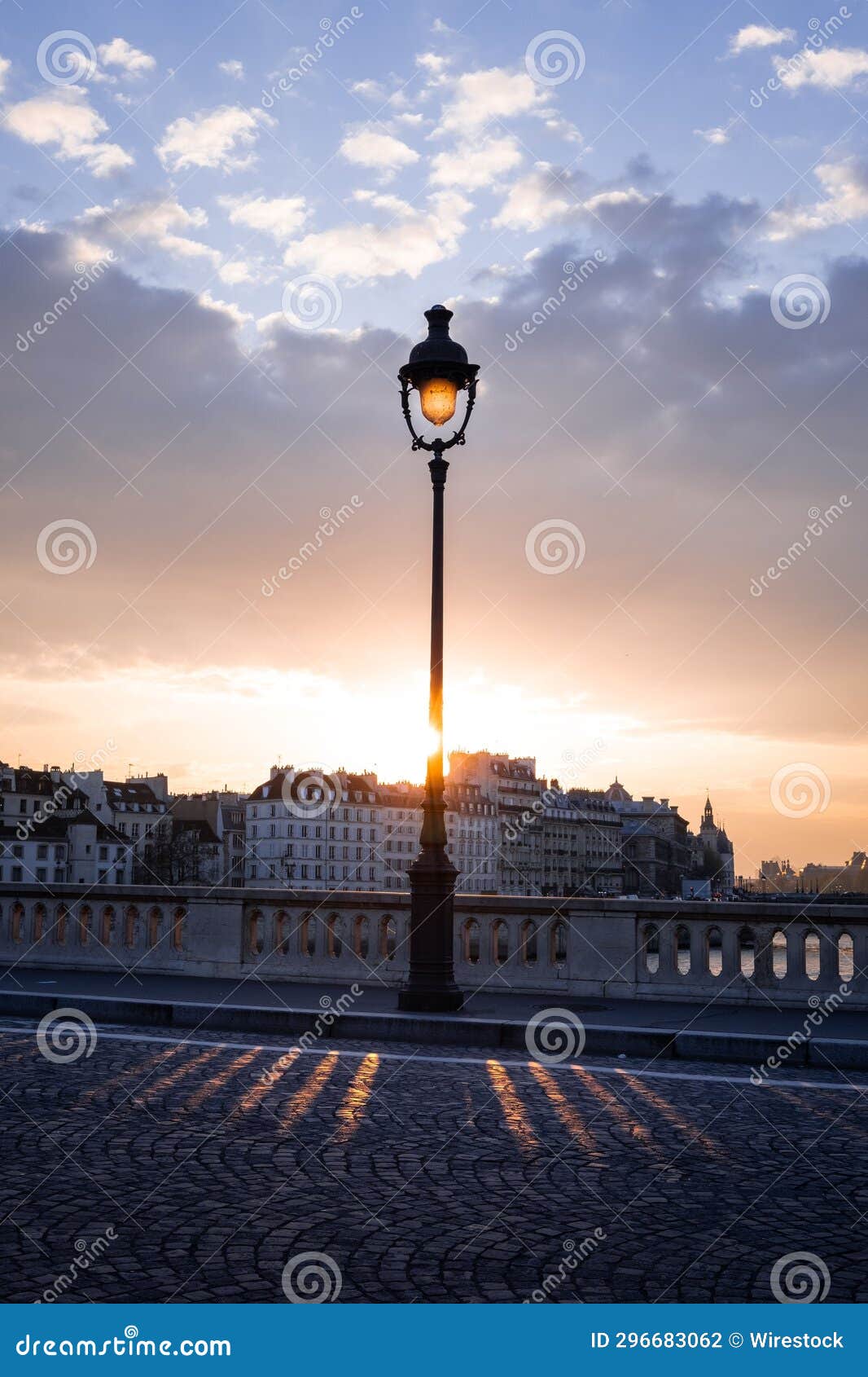 Lamp Post on a Bridge in Paris at Sunset Stock Photo - Image of urban ...