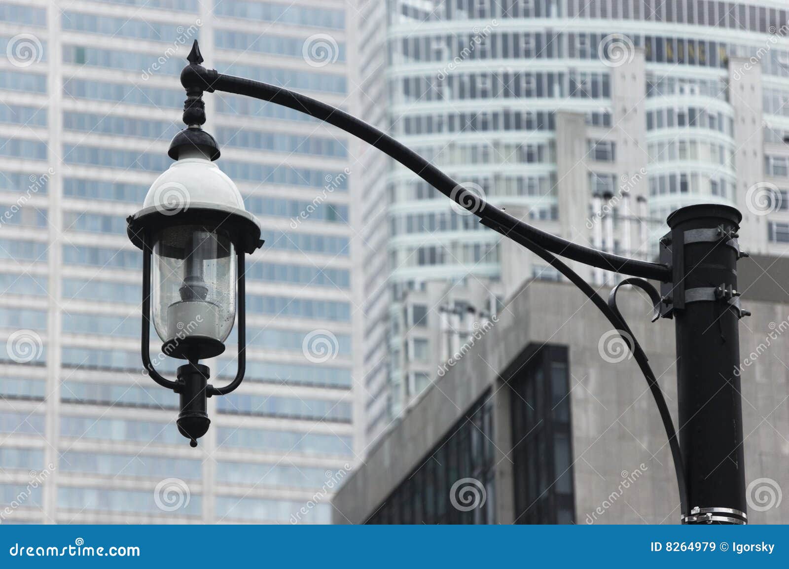 Lamp-post with City Background Stock Image - Image of wall, landscaped ...