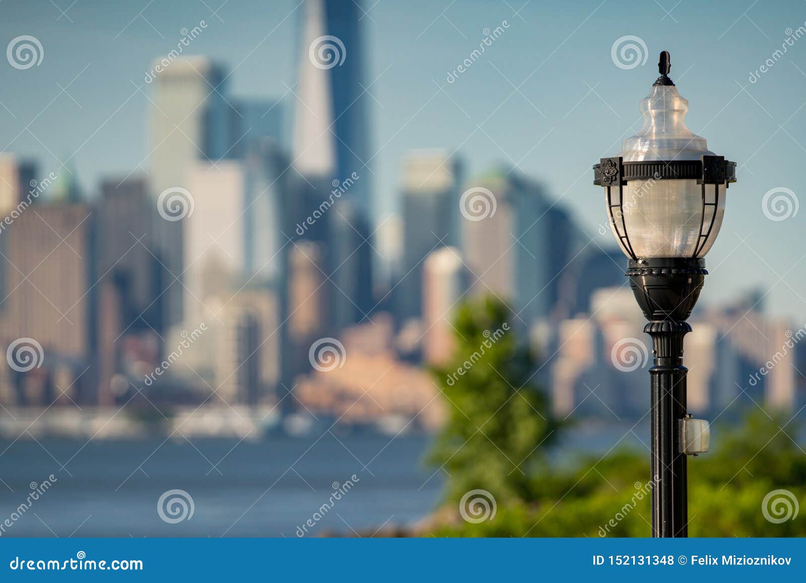 Lamp Post with New York City in the Background Stock Photo - Image of ...