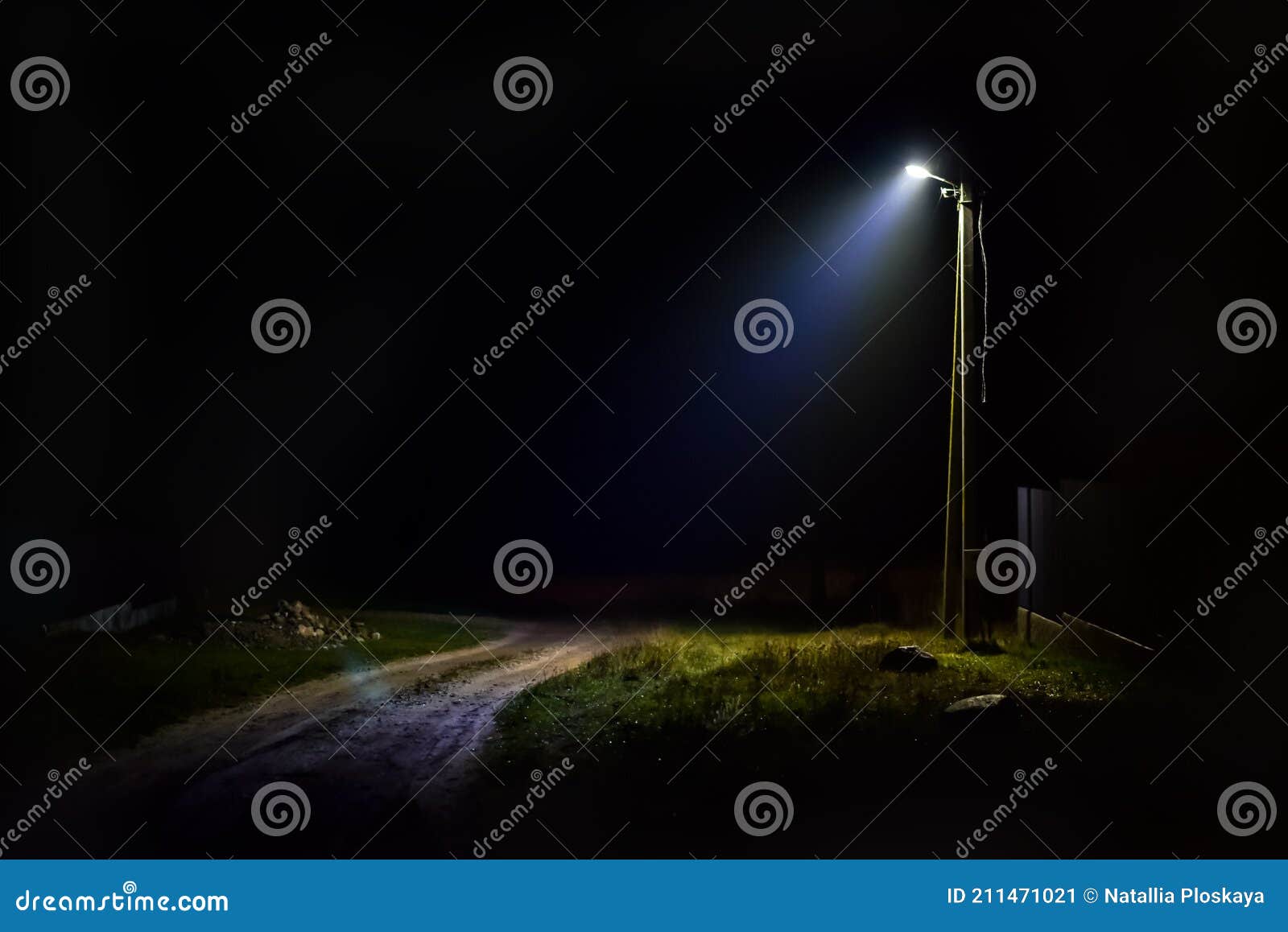 A lamp post at night. stock image. Image of road, motion - 211471021