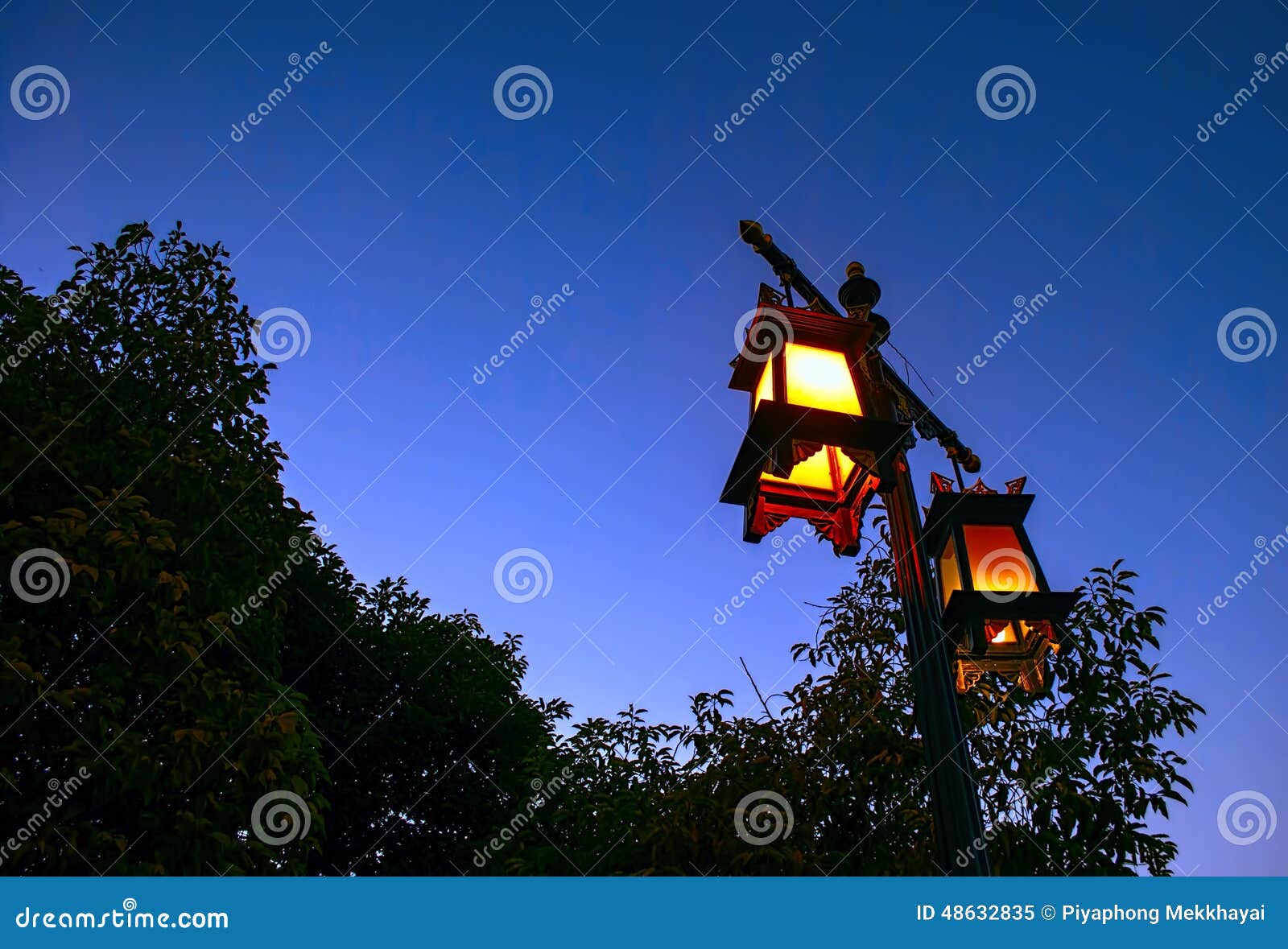 Lamp post in the night stock image. Image of light, street - 48632835