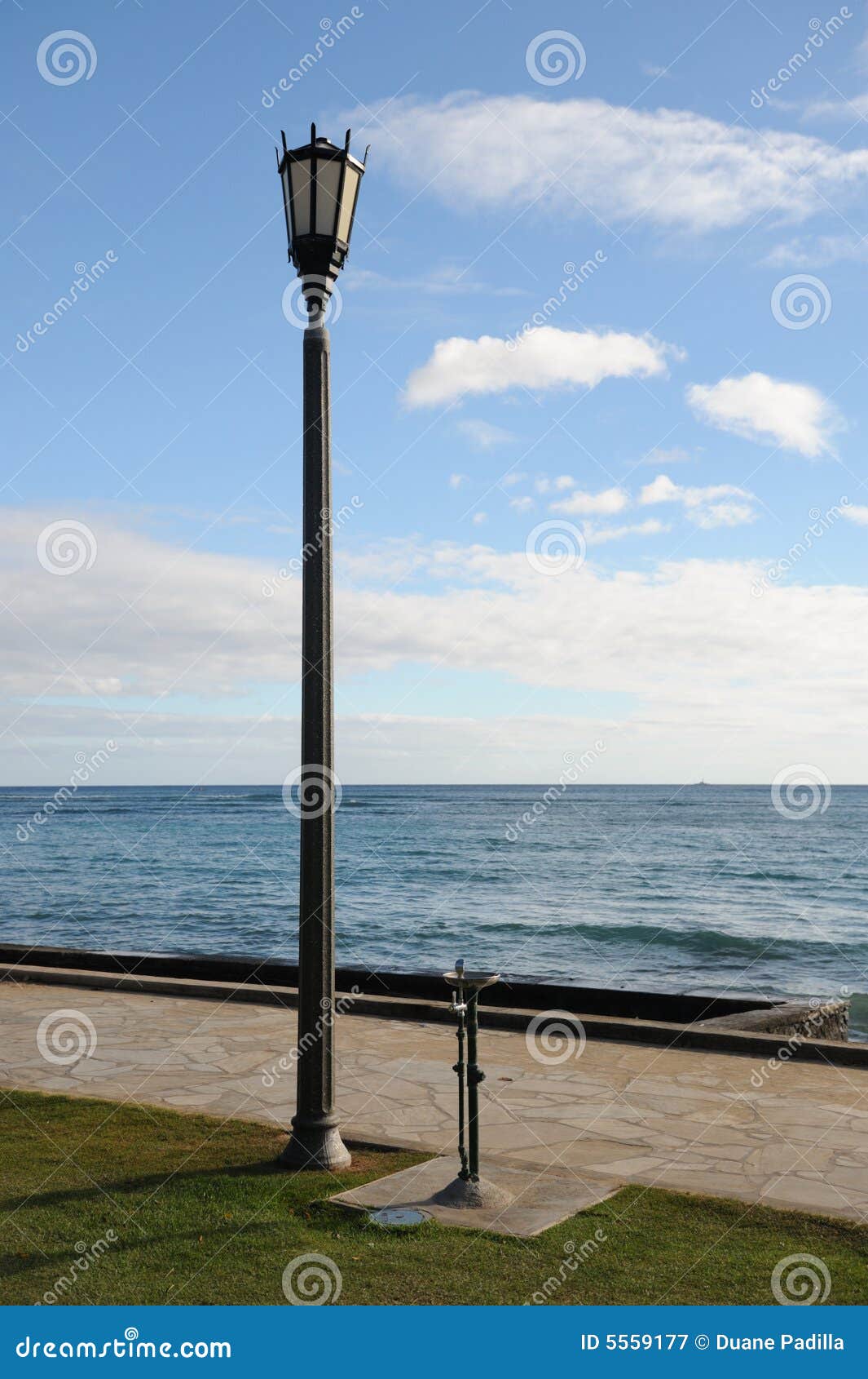 Lamp post by ocean stock image. Image of shore, cloudscape - 5559177