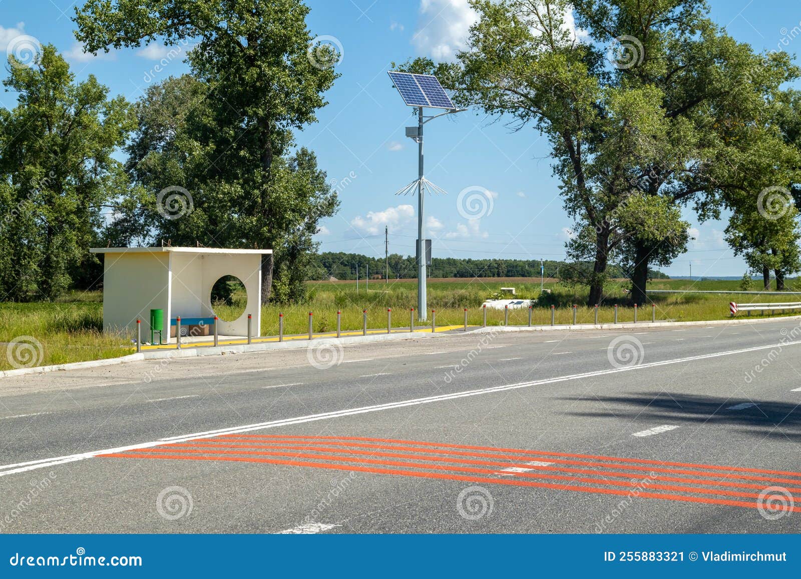 Lamp Post with Solar Panel System on Road with Blue Sky and Trees ...