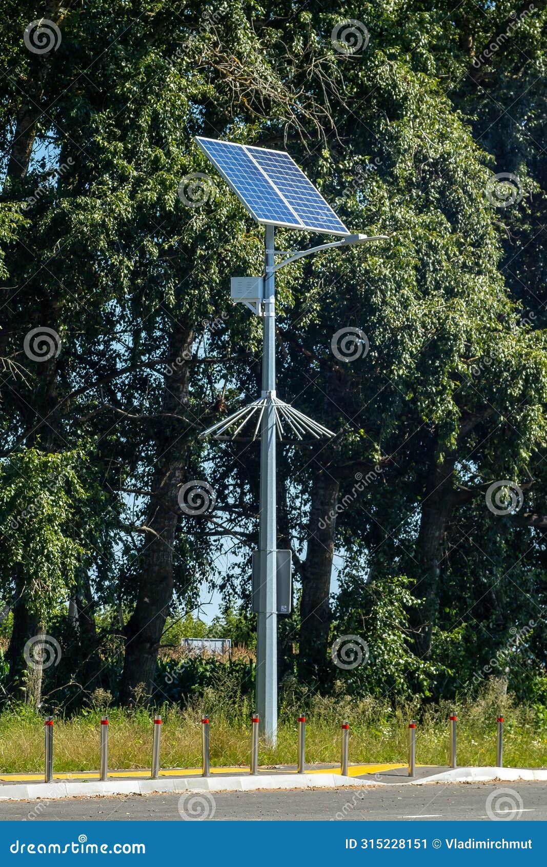 Lamp Post with Solar Panel System on Road with Blue Sky and Trees ...