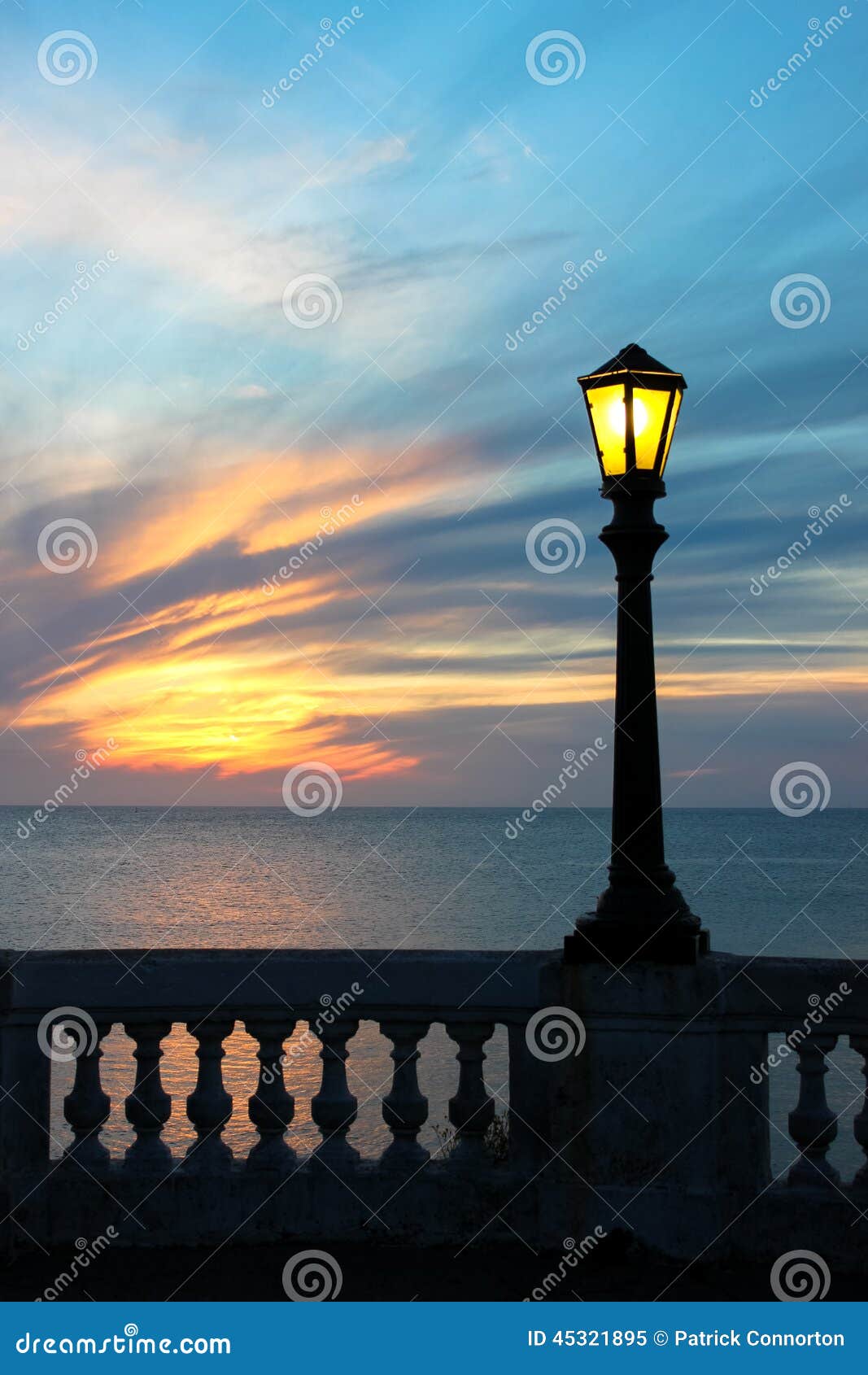 Lamp Post at Sunset stock image. Image of eletricity - 45321895