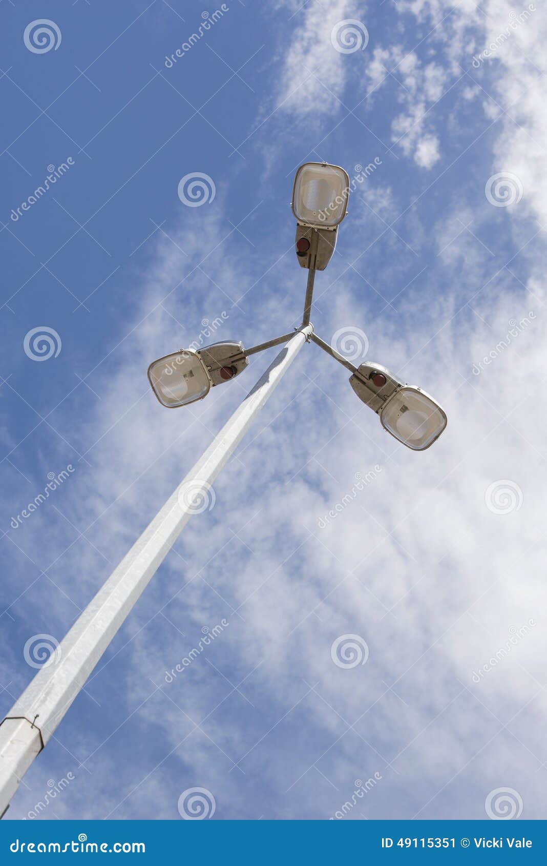 Lamp Post with Three Lights Against a Blue Sky. Stock Image - Image of ...