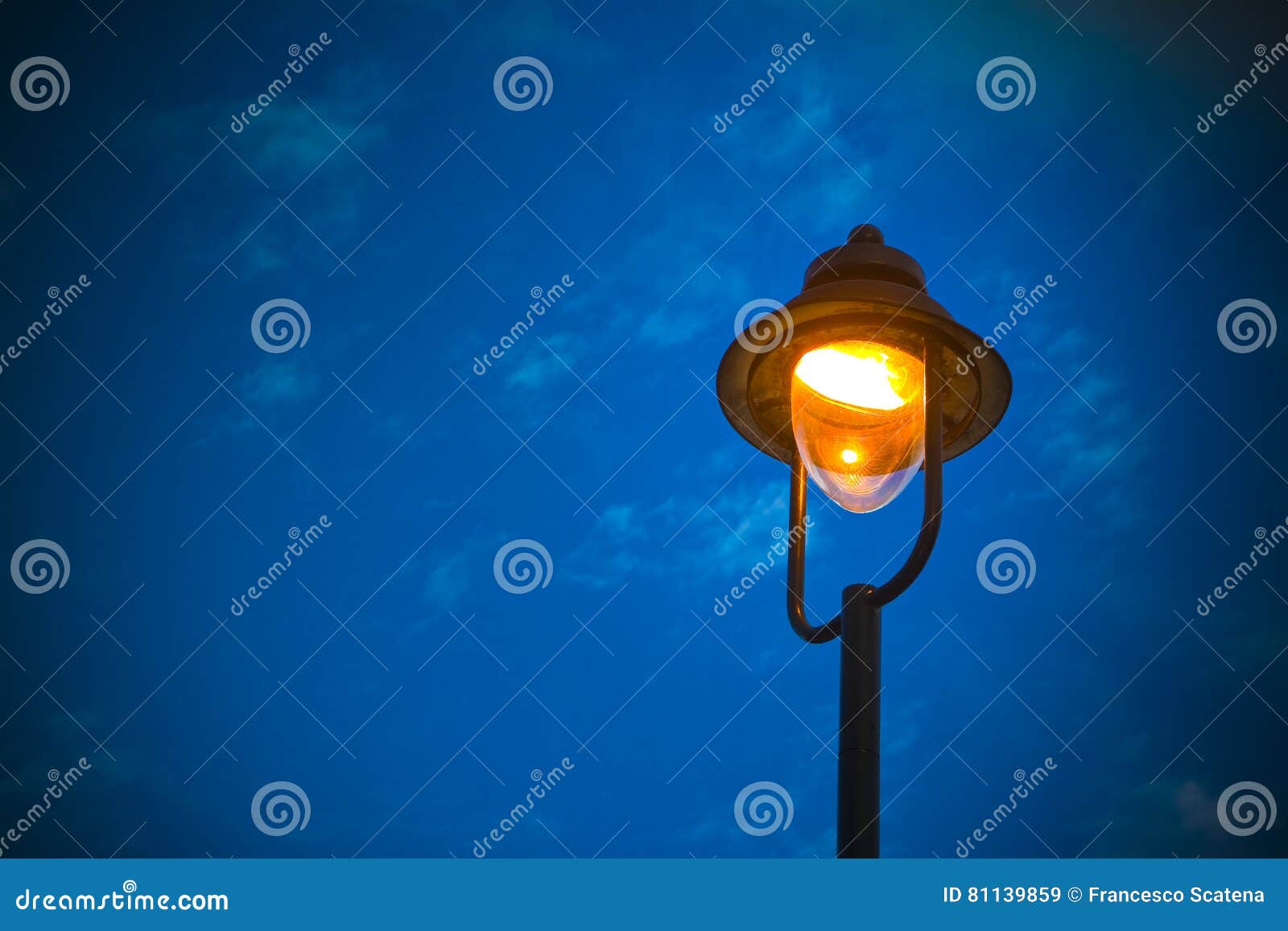Lamp Post Turned on Against a Dark Sky Stock Image - Image of dark ...
