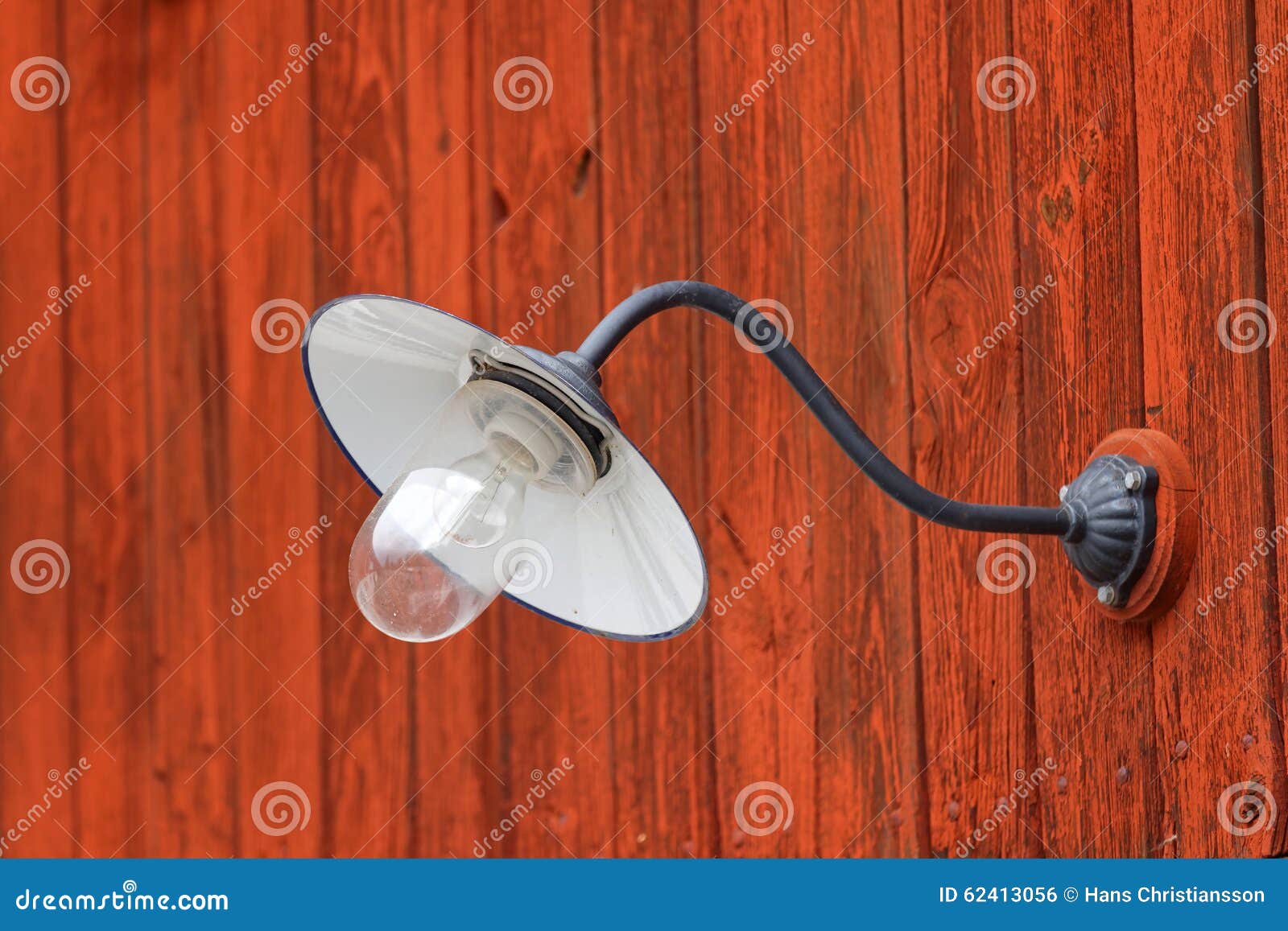 Lamp on a red barn wall stock photo. Image of rustic - 62413056
