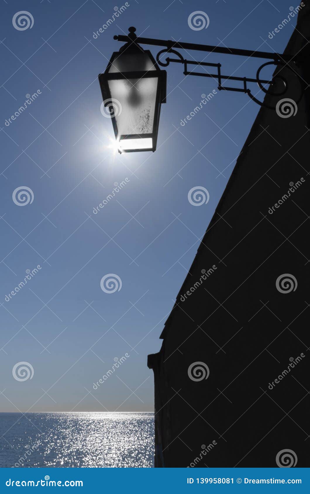 The Lamp on the Sea Lights Up with the Light of the Sun Stock Image ...