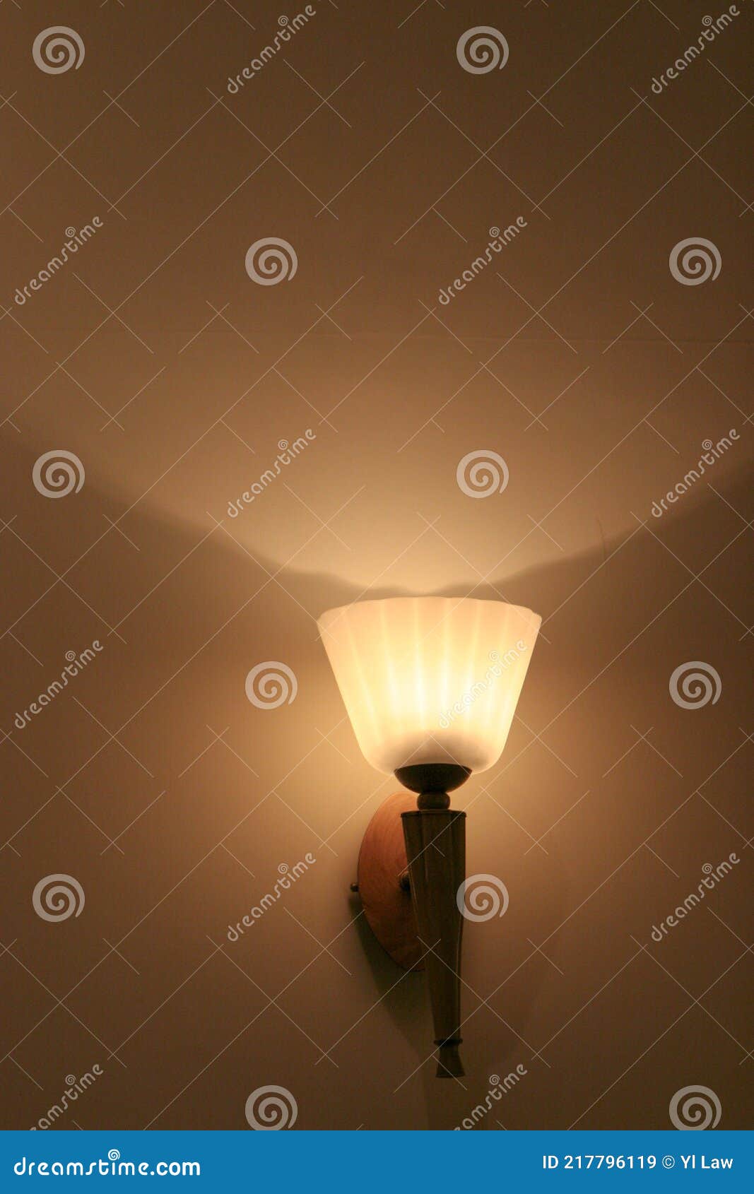 Lamp Shines with Warm Light on the Wall. Warm Lighting Stock Image ...
