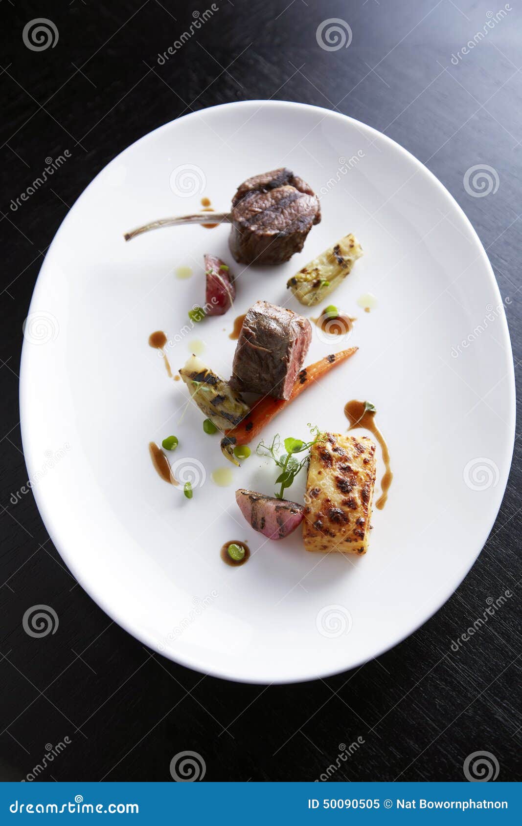 Lamp steak on white plate stock image. Image of platter - 50090505