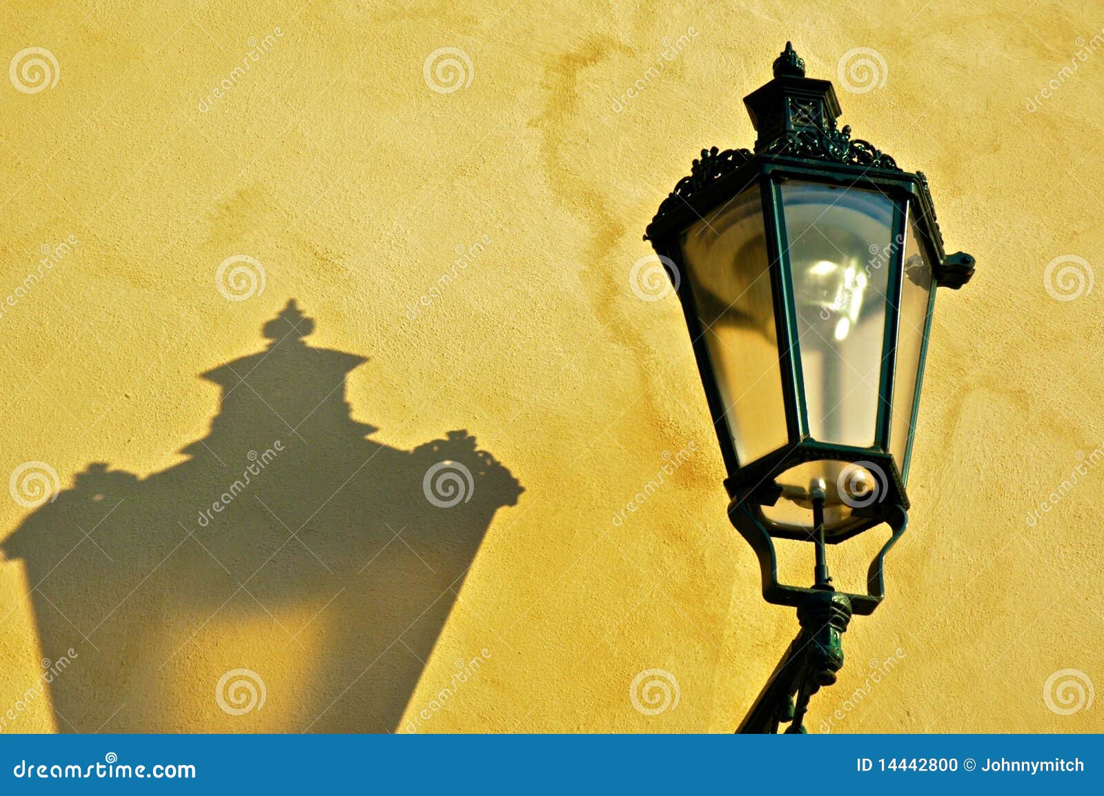 Lamp on Yellow Wall stock photo. Image of wall, light - 14442800