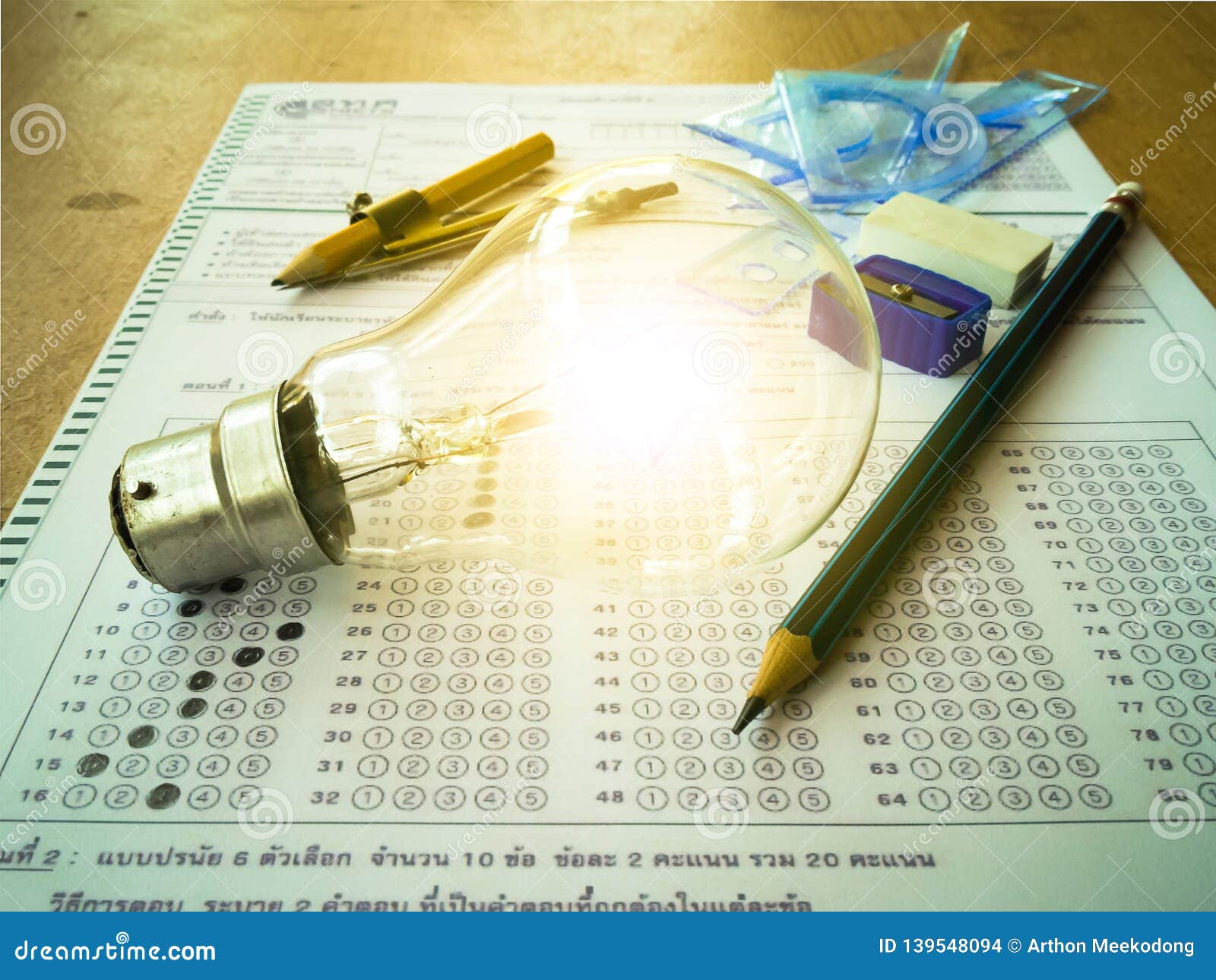 Lamps and Stationery Placed in the Answer Sheet with Educational ...