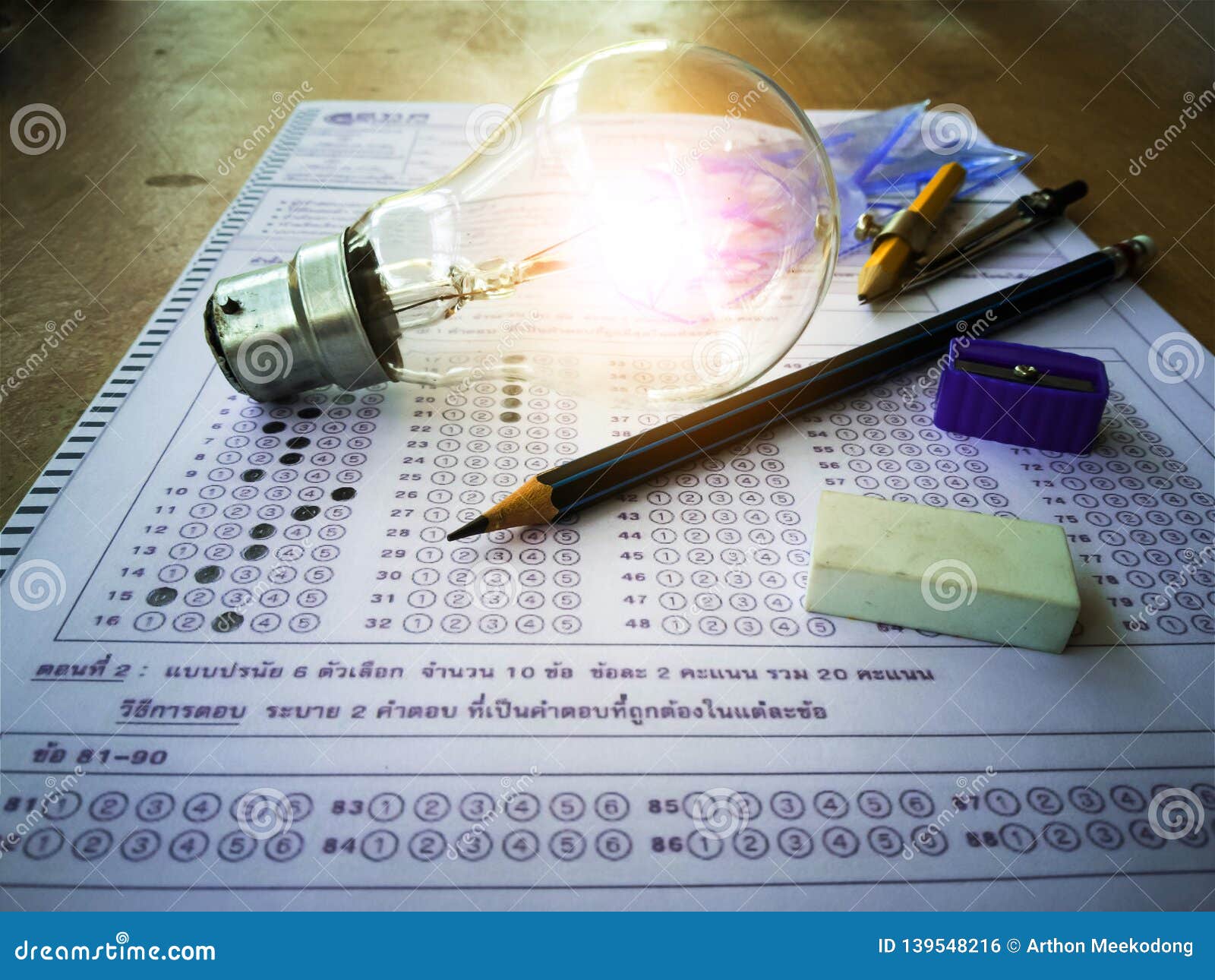 Lamps and Stationery Placed in the Answer Sheet with Educational ...