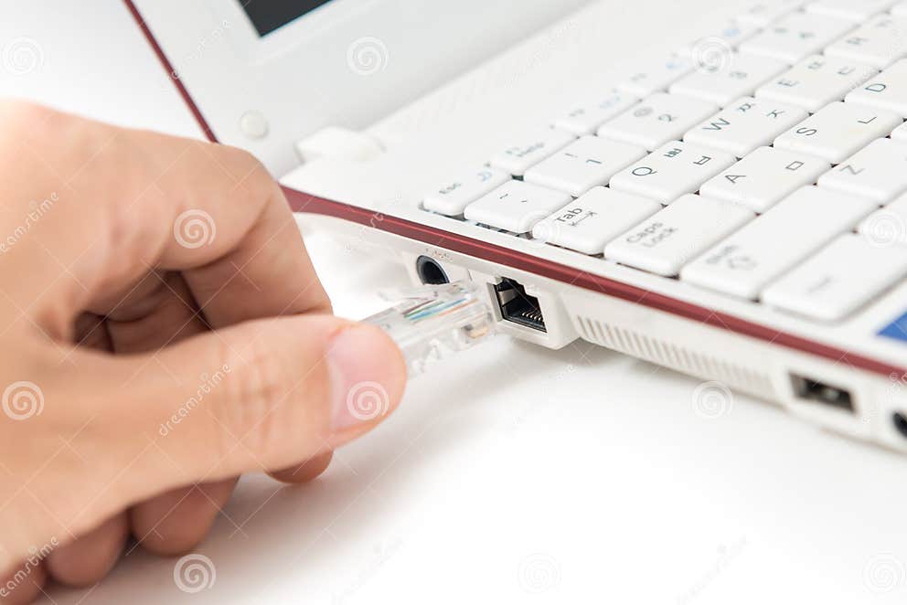 LAN Cable is Connecting Internet To Laptop Stock Photo - Image of hand ...