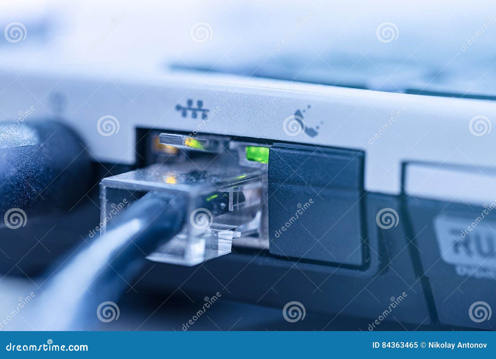 LAN Network Cable Connected To RJ-45 Port Notebook Close Up Stock Image ...