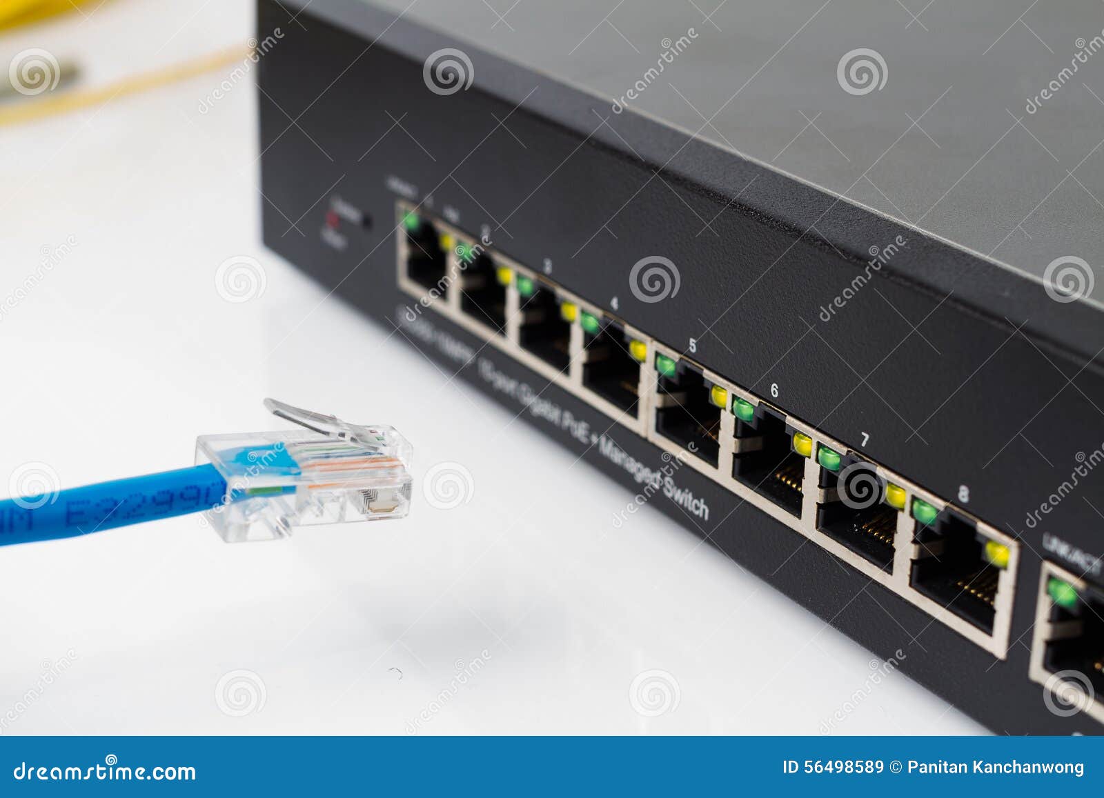 LAN Network Switch with Ethernet Cables Plugging in Stock Image - Image ...