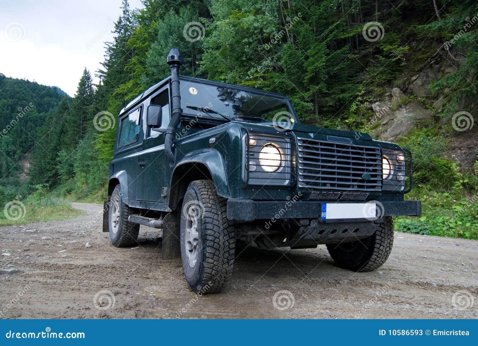 Land Rover on forest road stock image. Image of road - 10586593