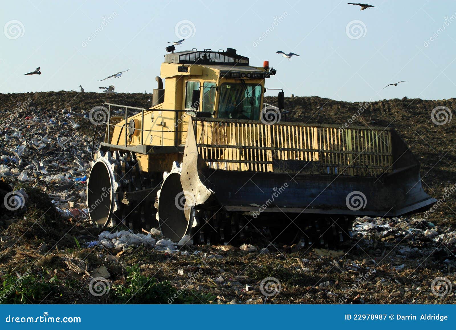 Landfill bulldozer stock image. Image of recycling, scavenging - 22978987