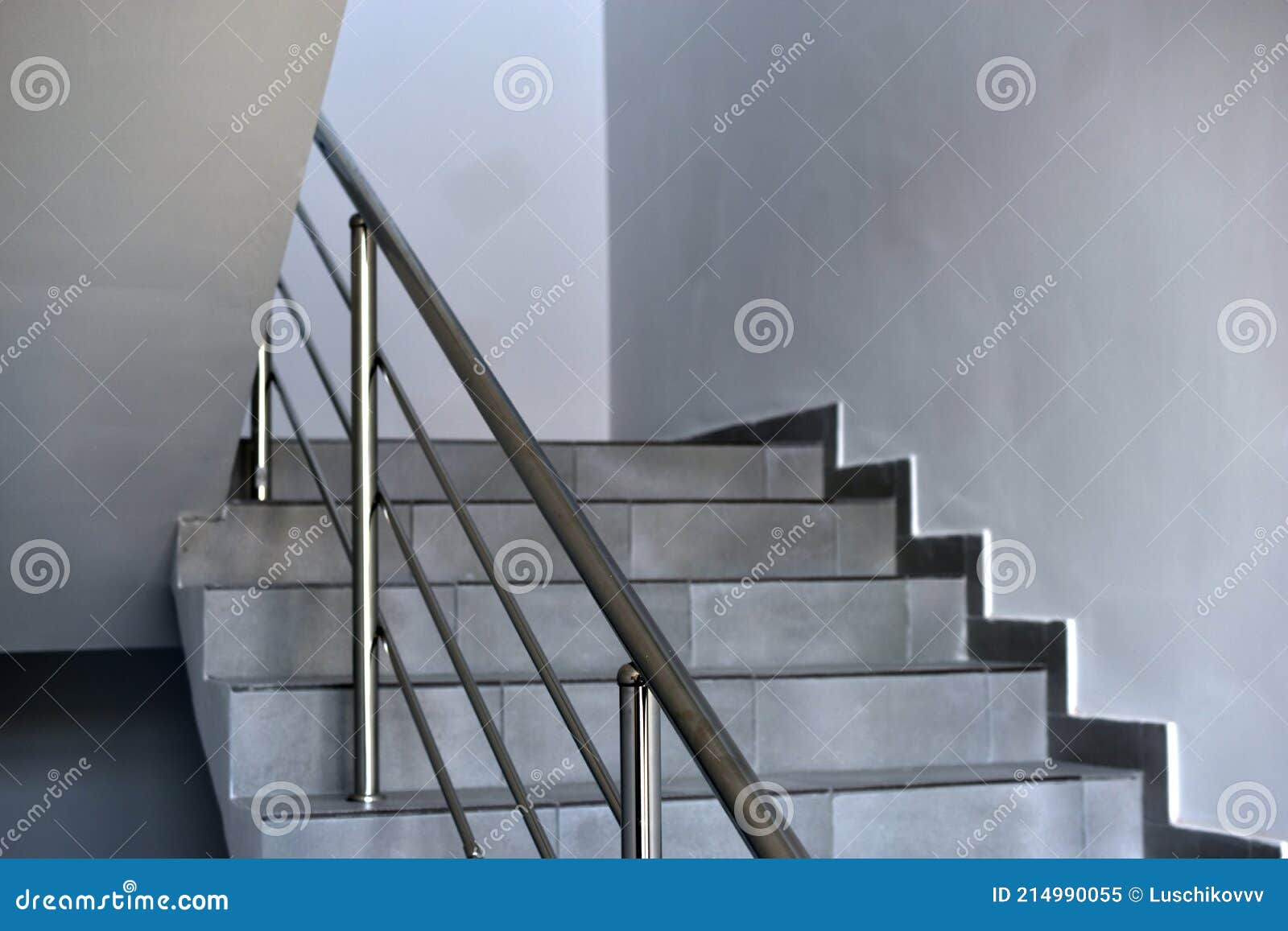 A Landing with a Staircase and a Shiny Railing Stock Image - Image of ...