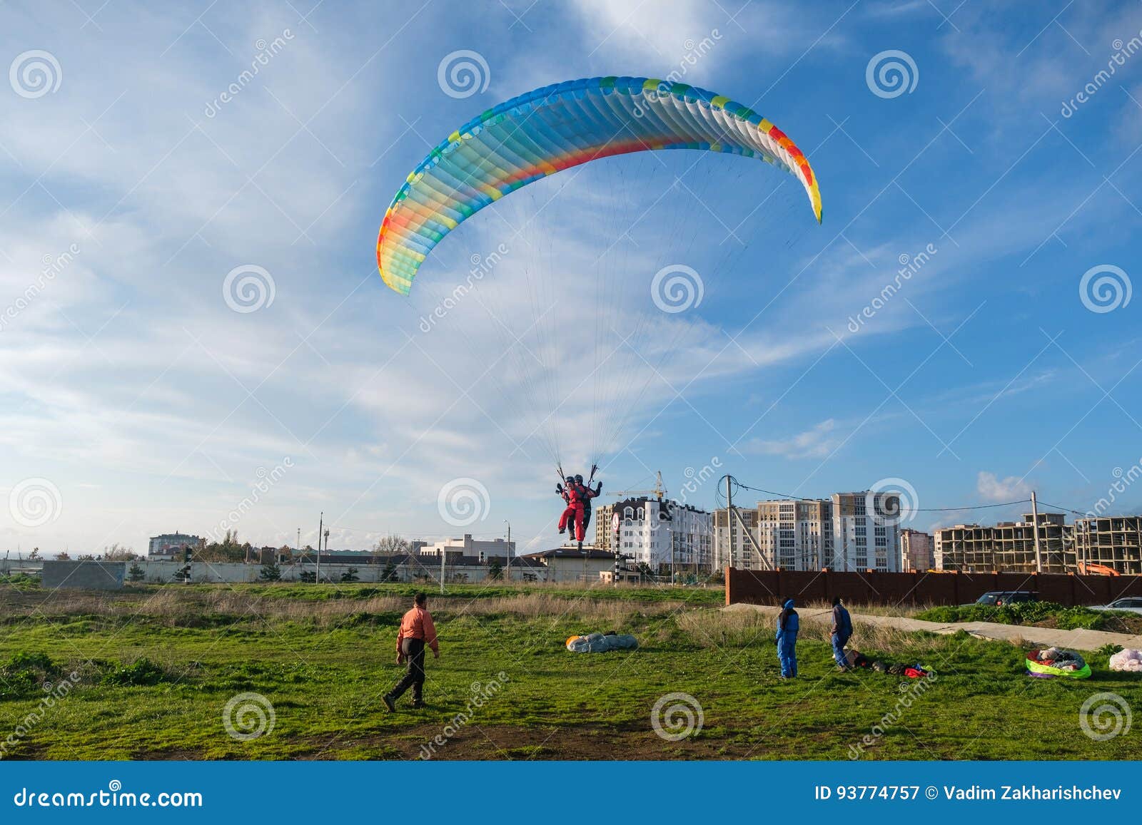 Landing a Tandem Paraglider on Paradrome on a Sunny Day Editorial ...