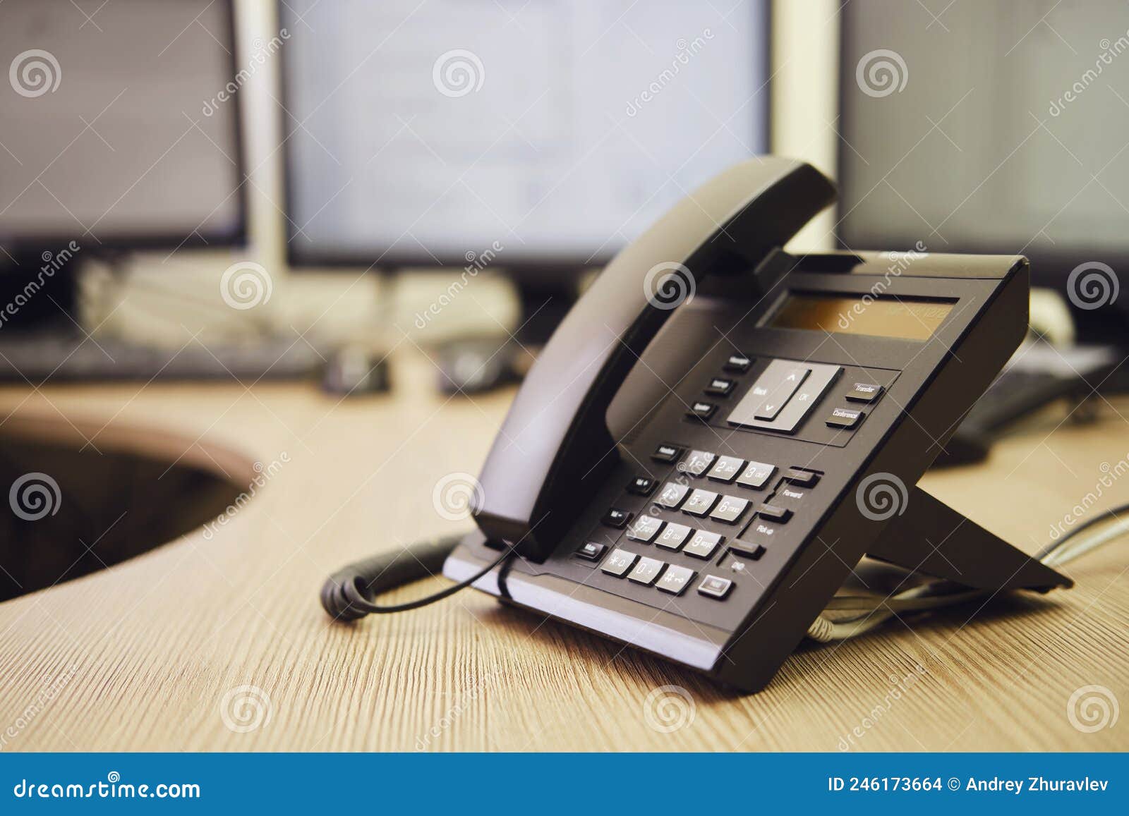Landline Phone on Office Desk with Computer Monitors and Keyboards ...