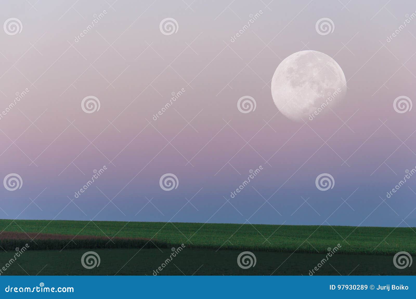 Landscape. Beautiful Big Moon Over the Green Field Stock Image - Image ...