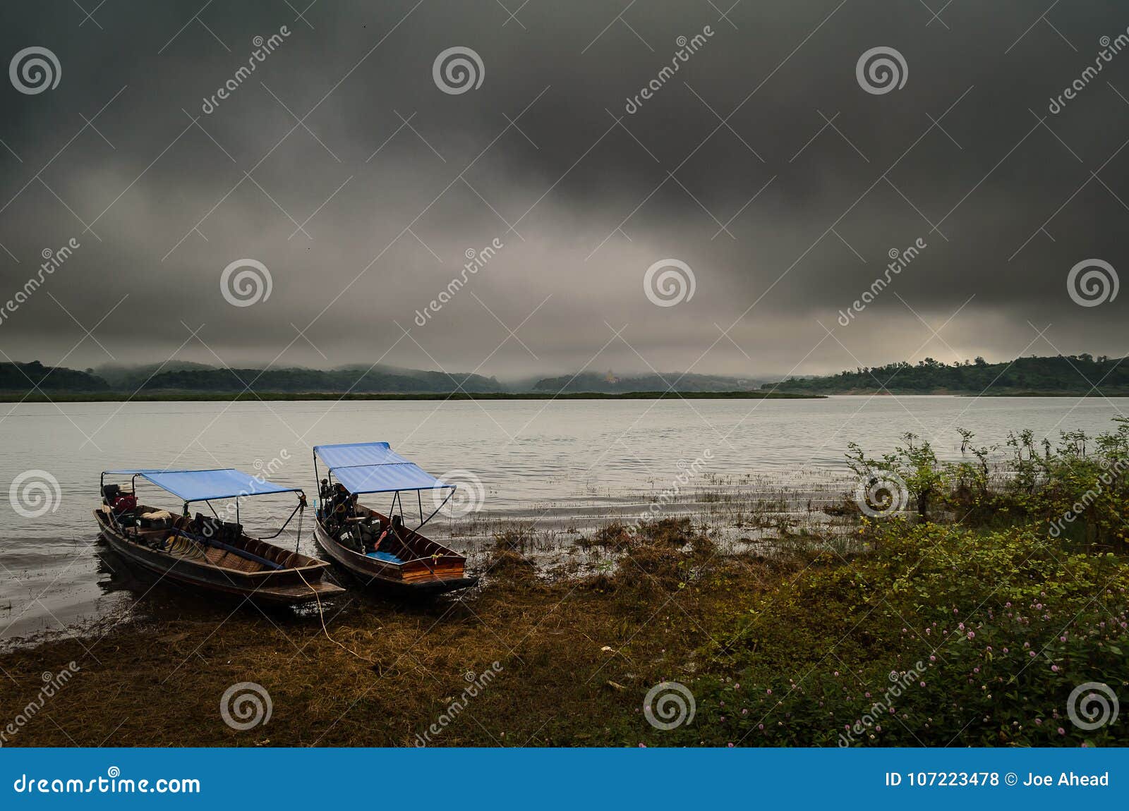 Landscape with Boat and Sea Under the Rain and Cloudy Sky in the Stock ...