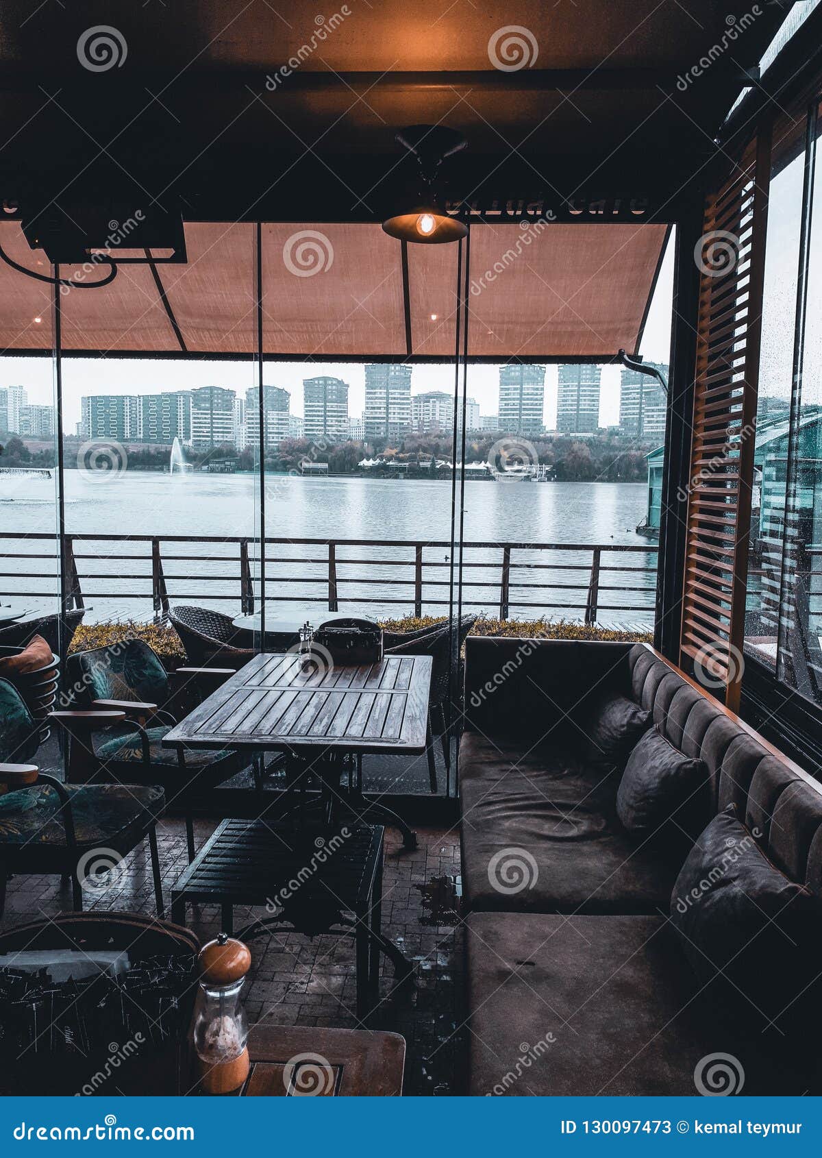 Landscape cafe stock image. Image of sittinggroup, rain - 130097473