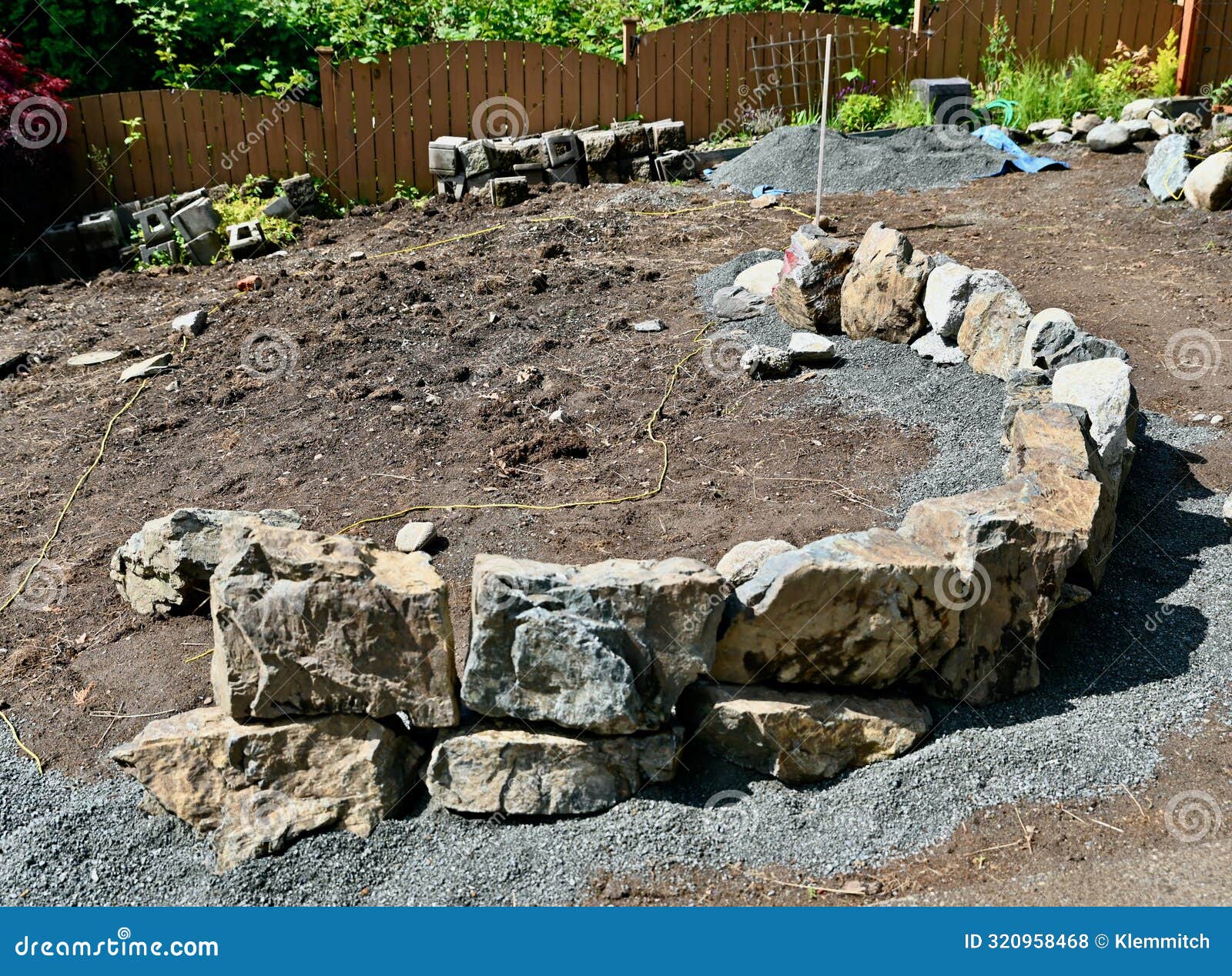 Outdoor Yard Garden Project of Terracing Building Stacked Boulder Rock ...