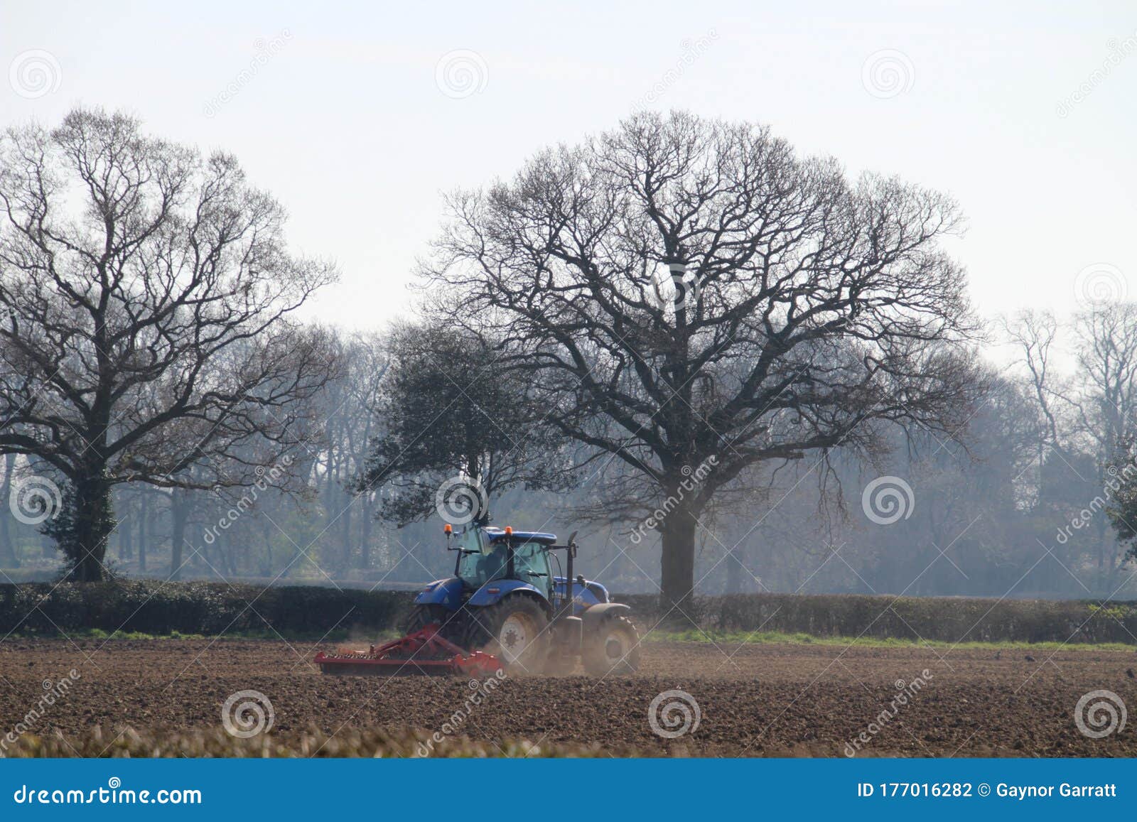 Landscape Farmer Ploughing His Fields Stock Photo - Image of warm ...