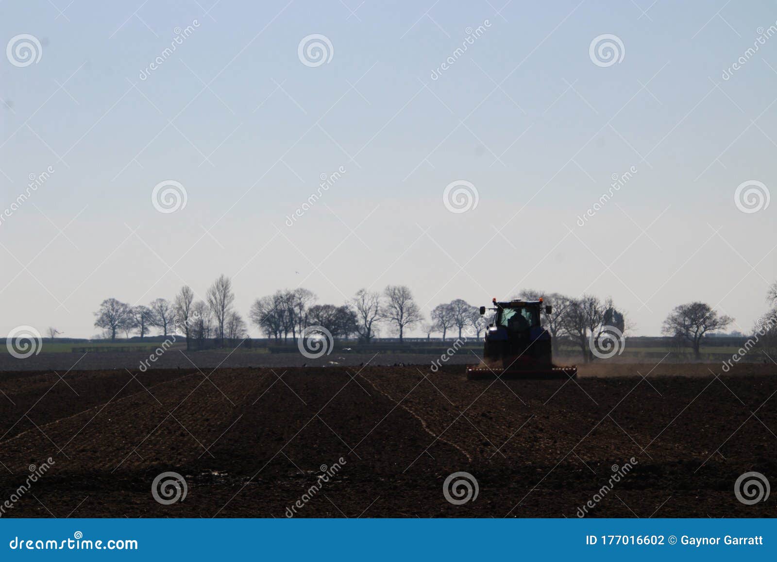 Landscape Farmer Ploughing His Fields Stock Photo - Image of farmer ...