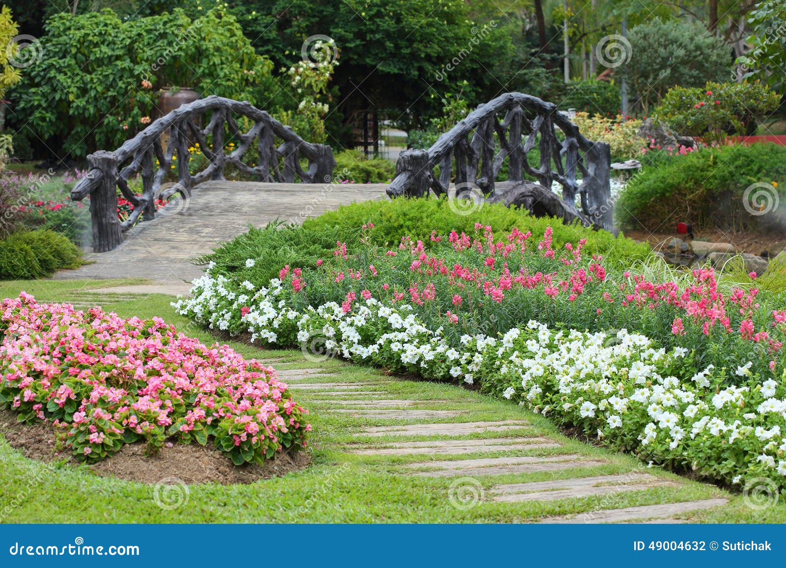 Landscape of Floral Gardening with Pathway and Bridge Stock Photo ...