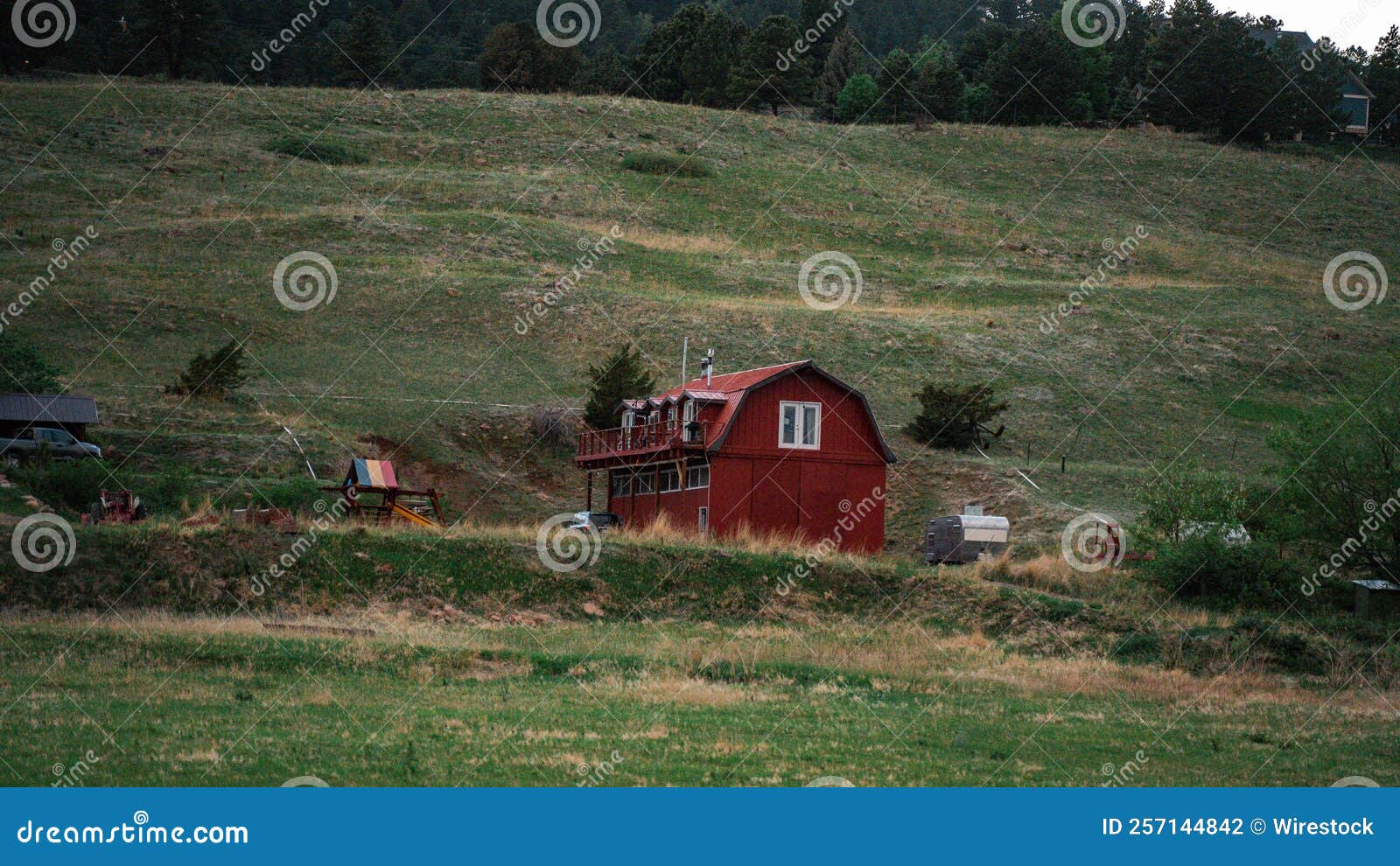 Landscape of a Green Hillside with a Red Barn Stock Photo - Image of ...