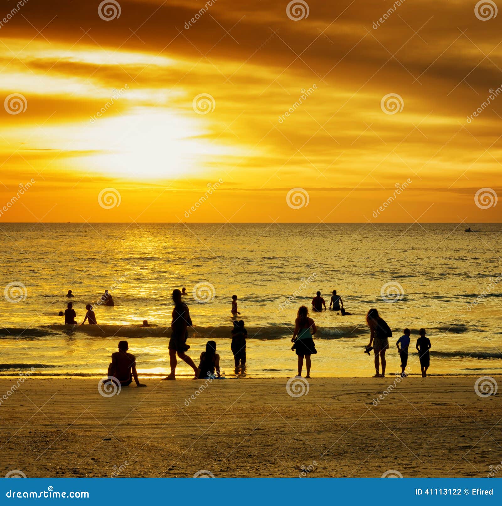 Group of People on Sunset Beach Stock Photo - Image of people, adults ...