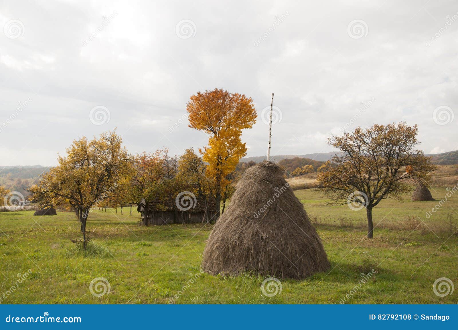 Landscape with haystack stock photo. Image of season - 82792108