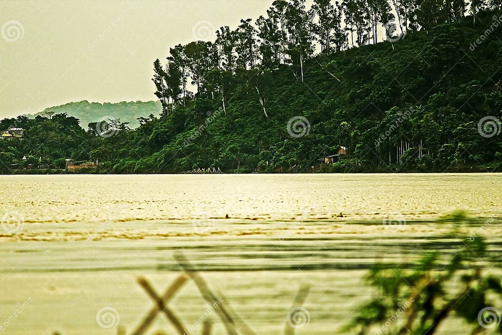 Landscape Image with Mountains, Trees and a River in Front. Beautiful ...