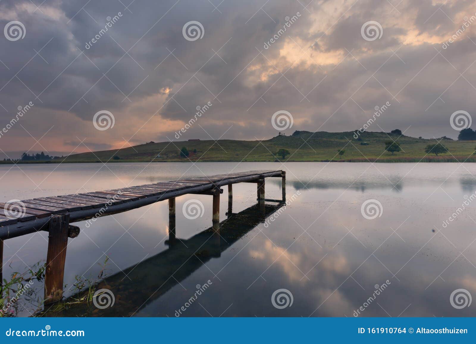 Landscape of a Jetty on a Dam with Dramatic Clouds of Rain Storm Stock ...