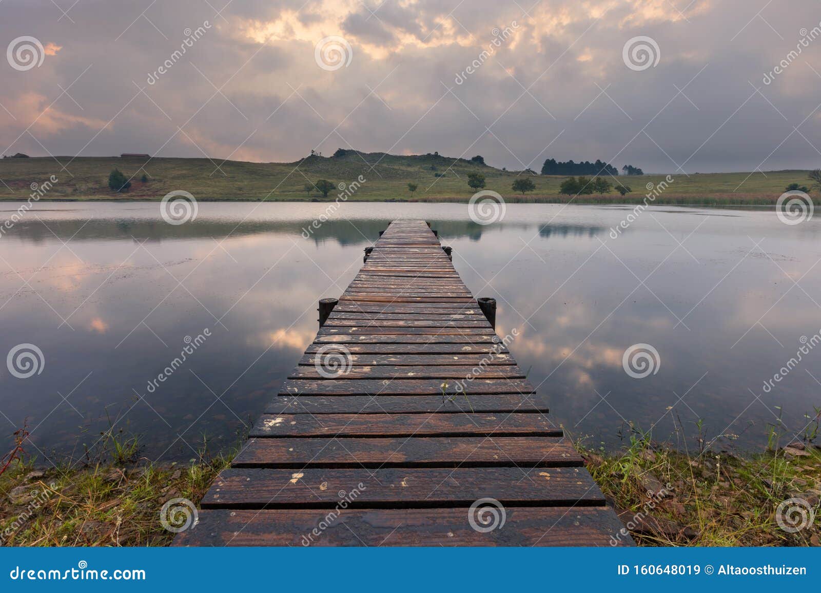 Landscape of a Jetty on a Dam with Dramatic Clouds of Rain Storm Stock ...