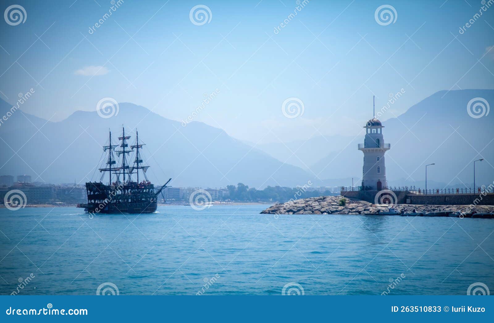 Landscape of Medieval Lighthouse and Three-masted Vintage Ship Stock ...