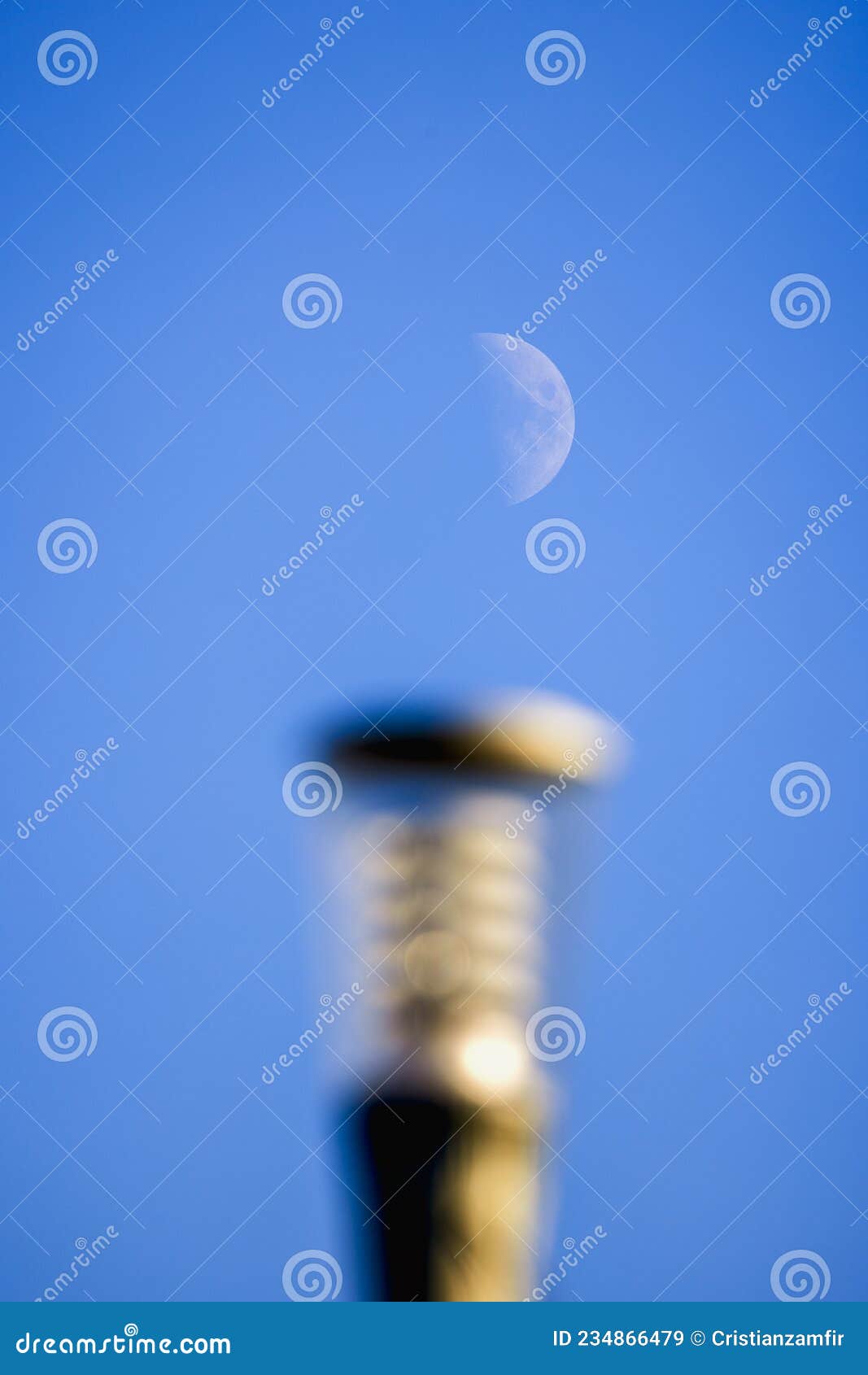 Landscape with the Moon in Focus and a Blurred Street Light. Stock ...